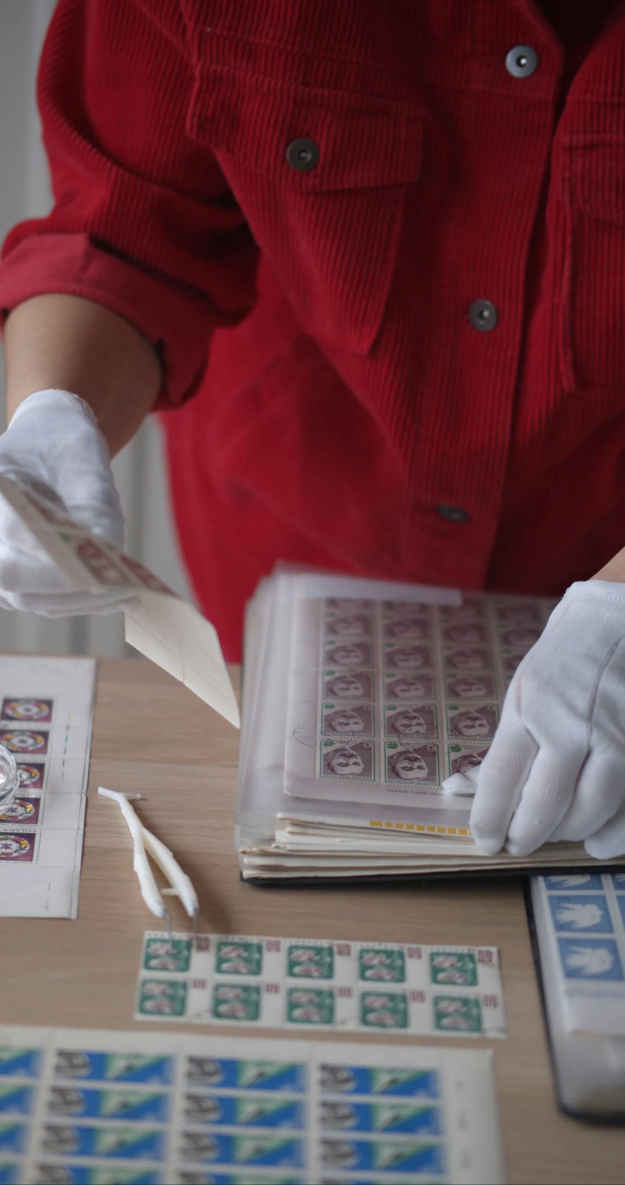 A Person Arranging Stamps Free Stock Video Footage, Royalty-Free 4K ...