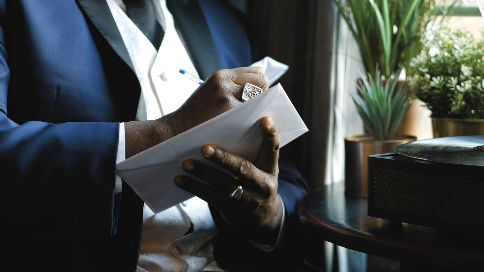 A Man Writing while Listening to Music Free Stock Video Footage ...