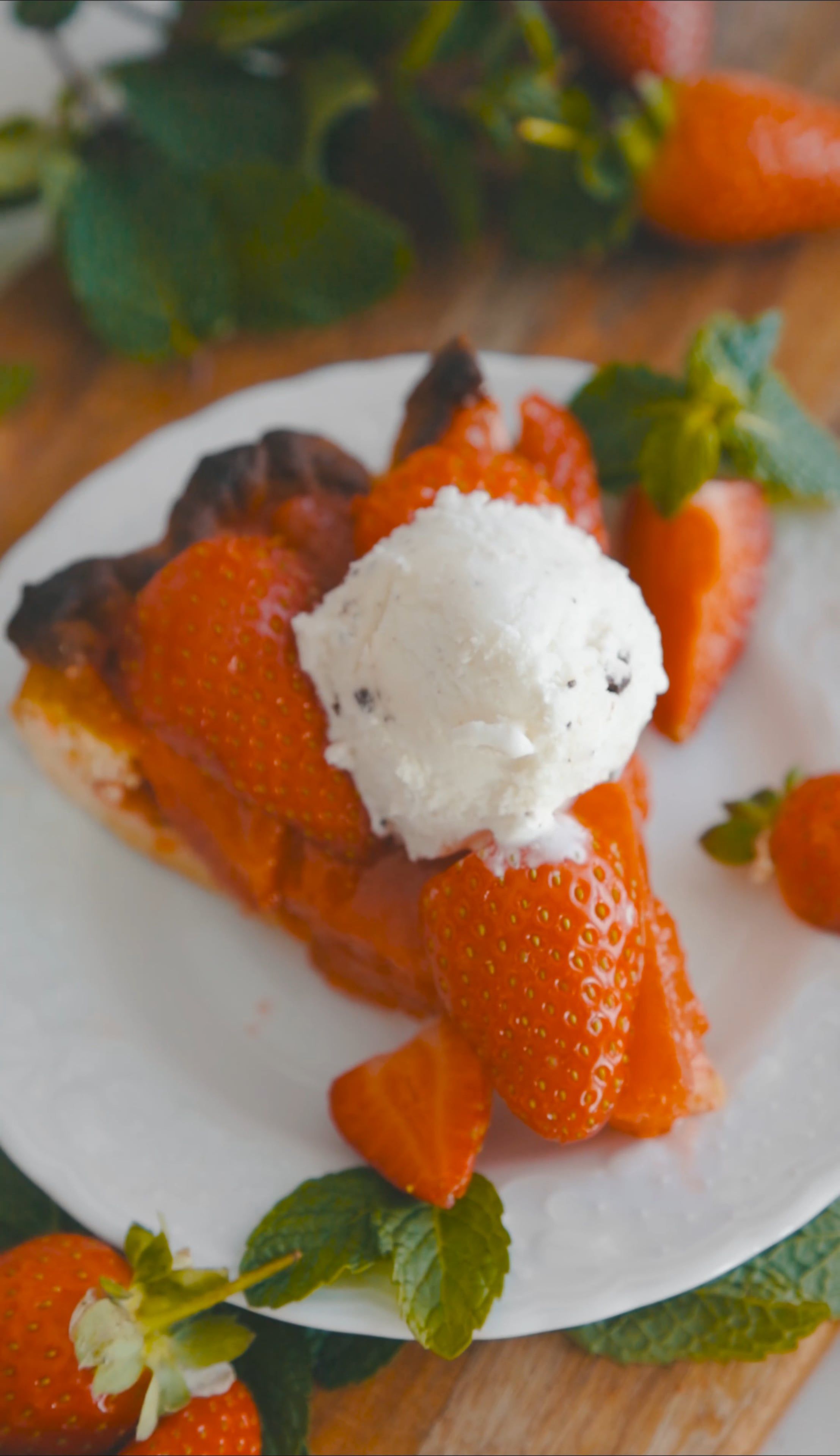 A Person Garnishing a Strawberry Pie · Free Stock Video