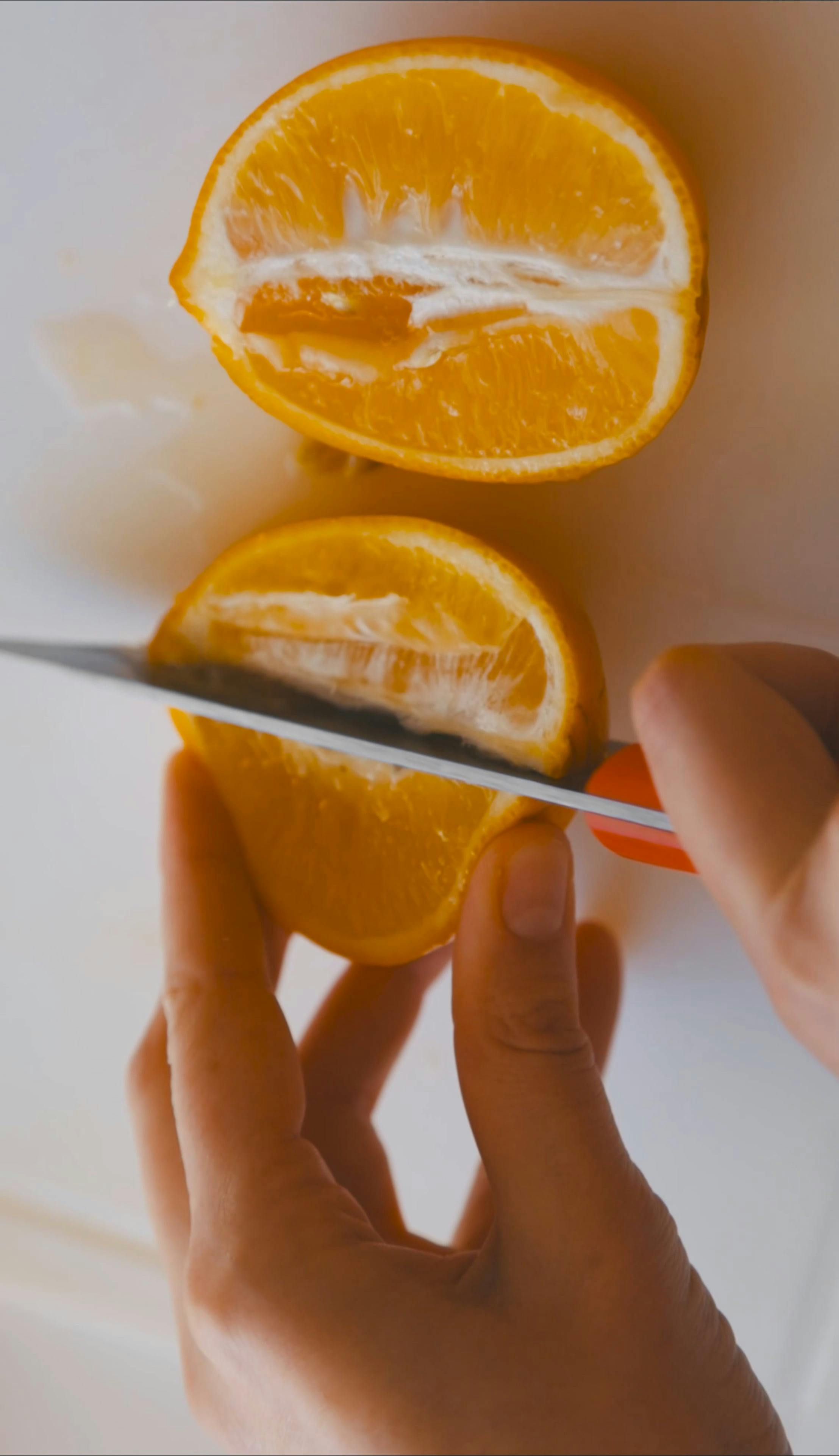 Cutting Orange into Segment · Free Stock Video