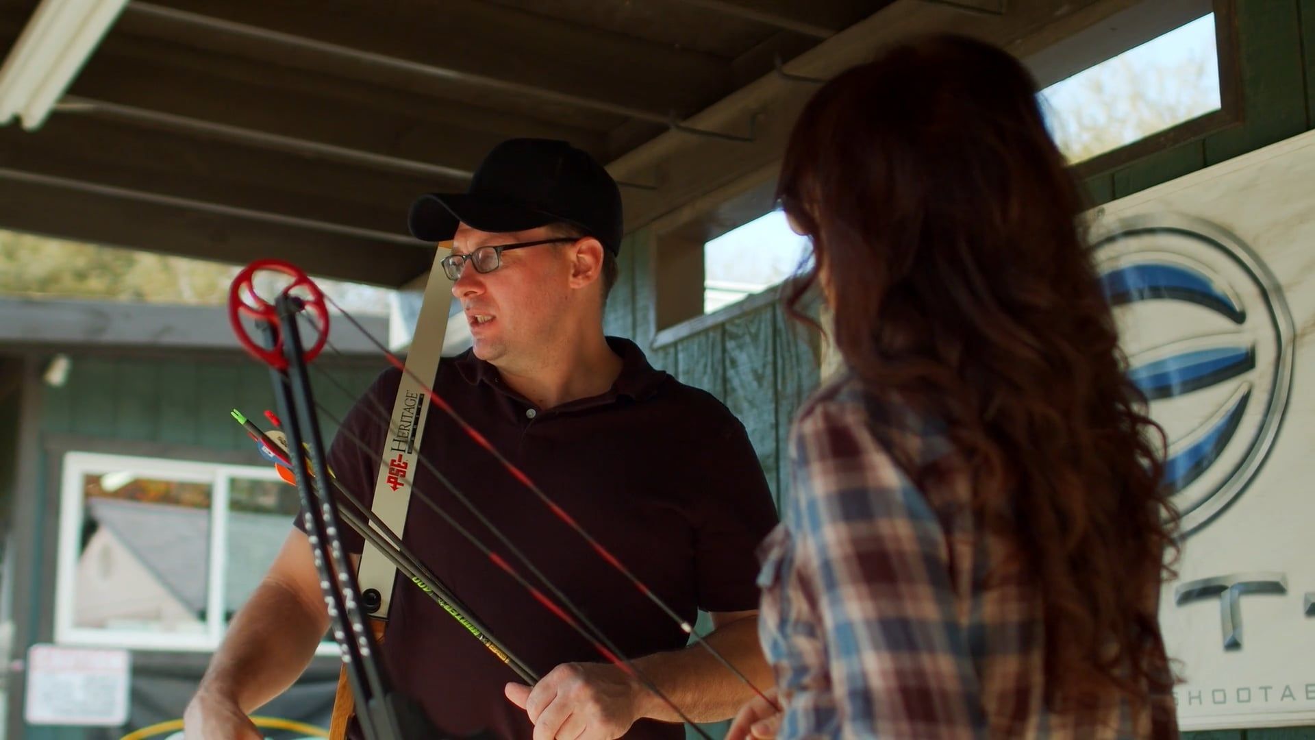 A Man and a Woman Talking in an Archery Range Free Stock Video Footage ...