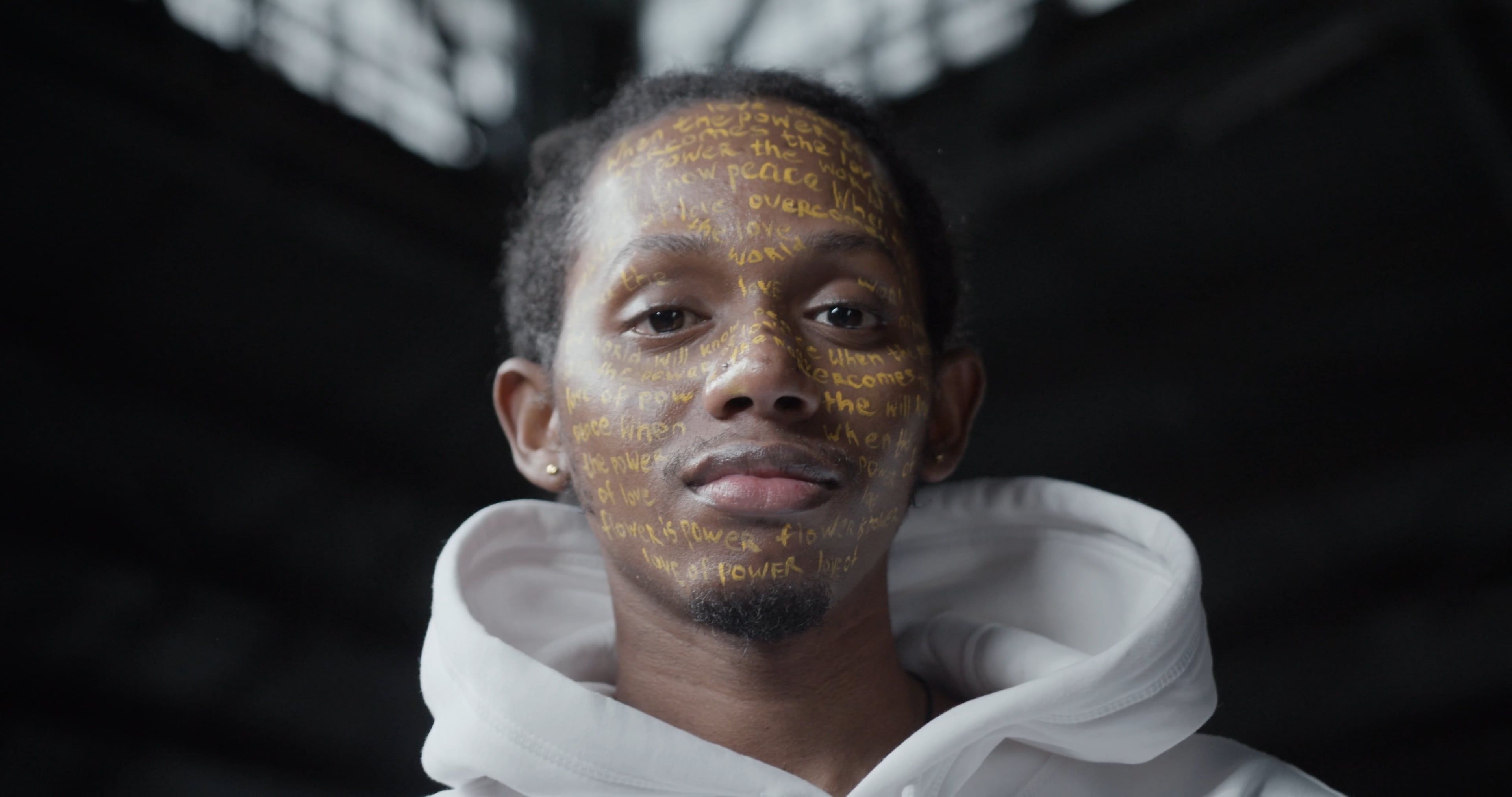 Man's Face Covered With Words · Free Stock Video