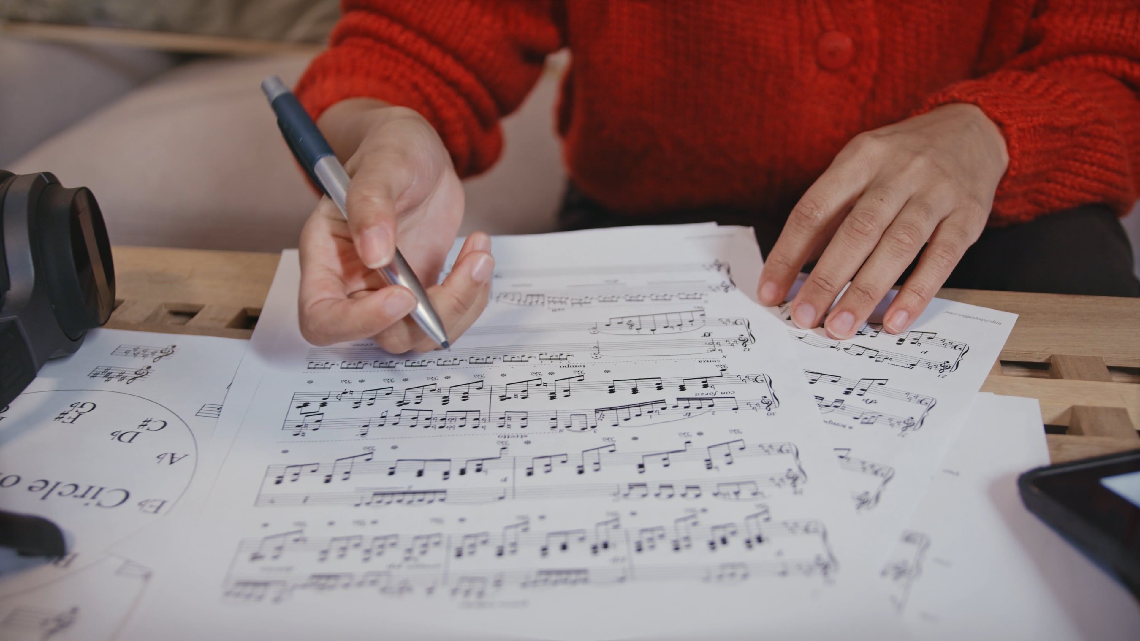 A Person Writing on Musical Sheets Free Stock Video Footage, Royalty ...