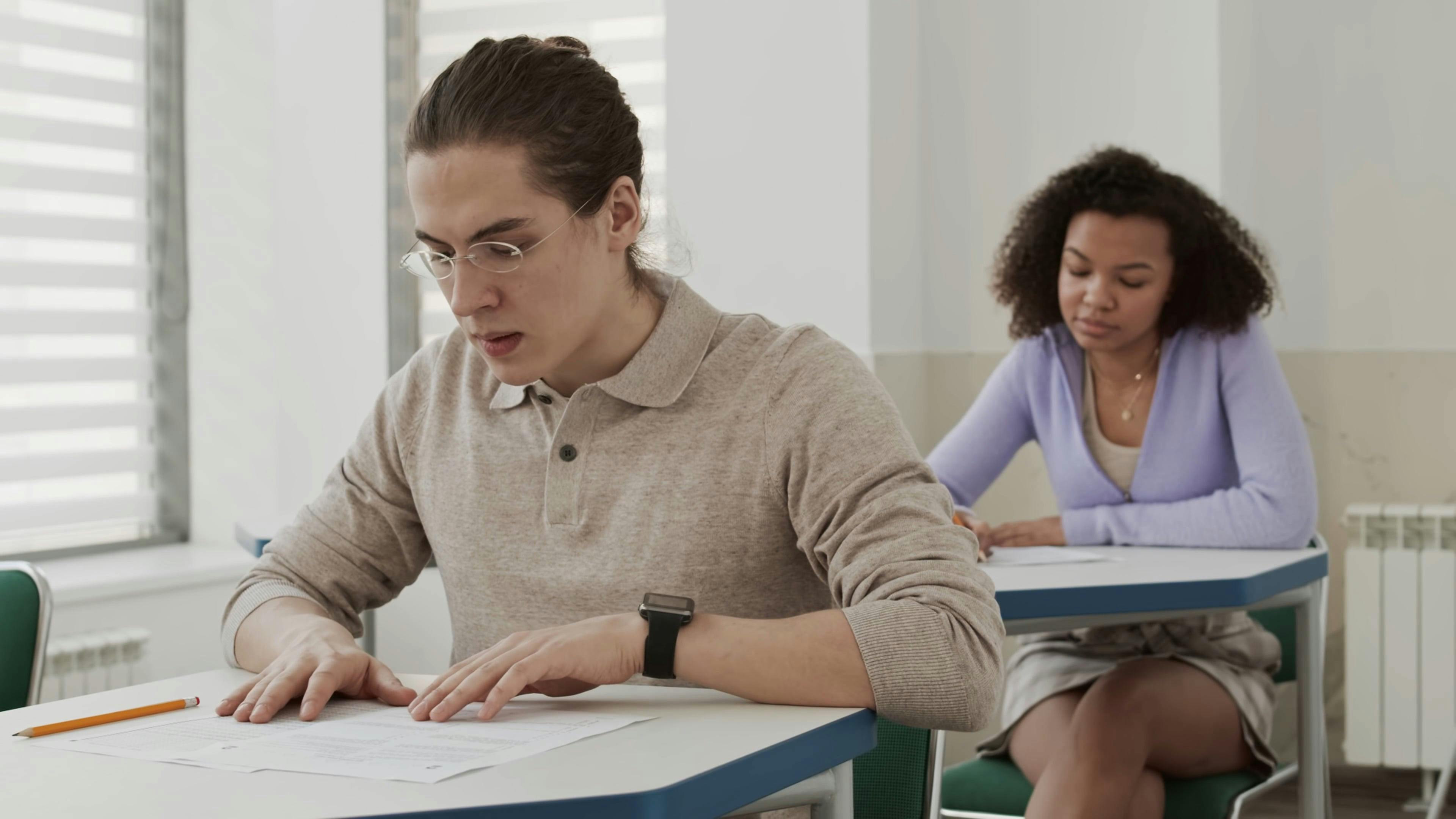 Student Preparing to Answer Examination · Free Stock Video