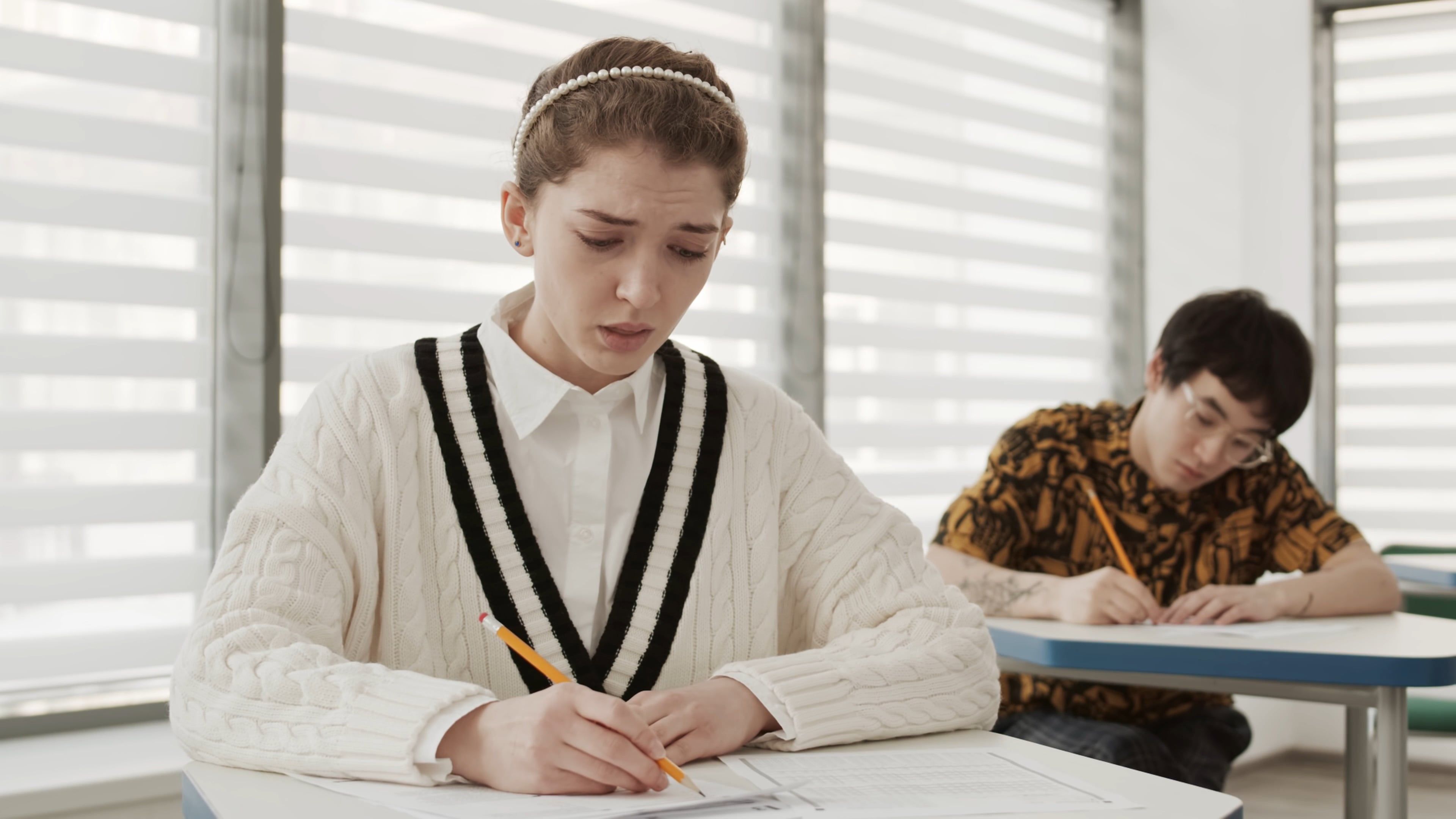 A Woman Crying While Taking an Examination · Free Stock Video
