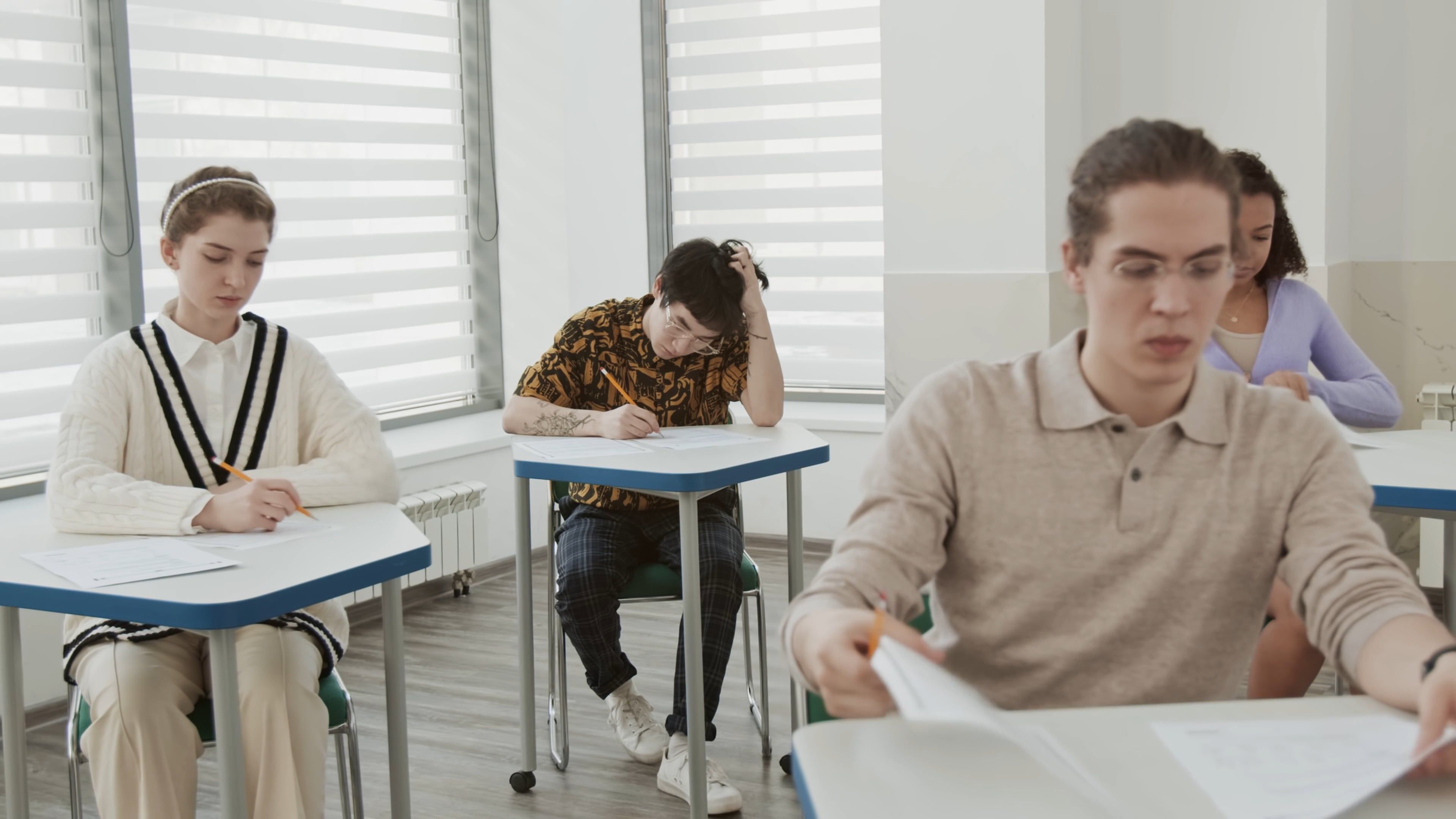 Students Standing and Giving their Examination Papers Free Stock Video ...