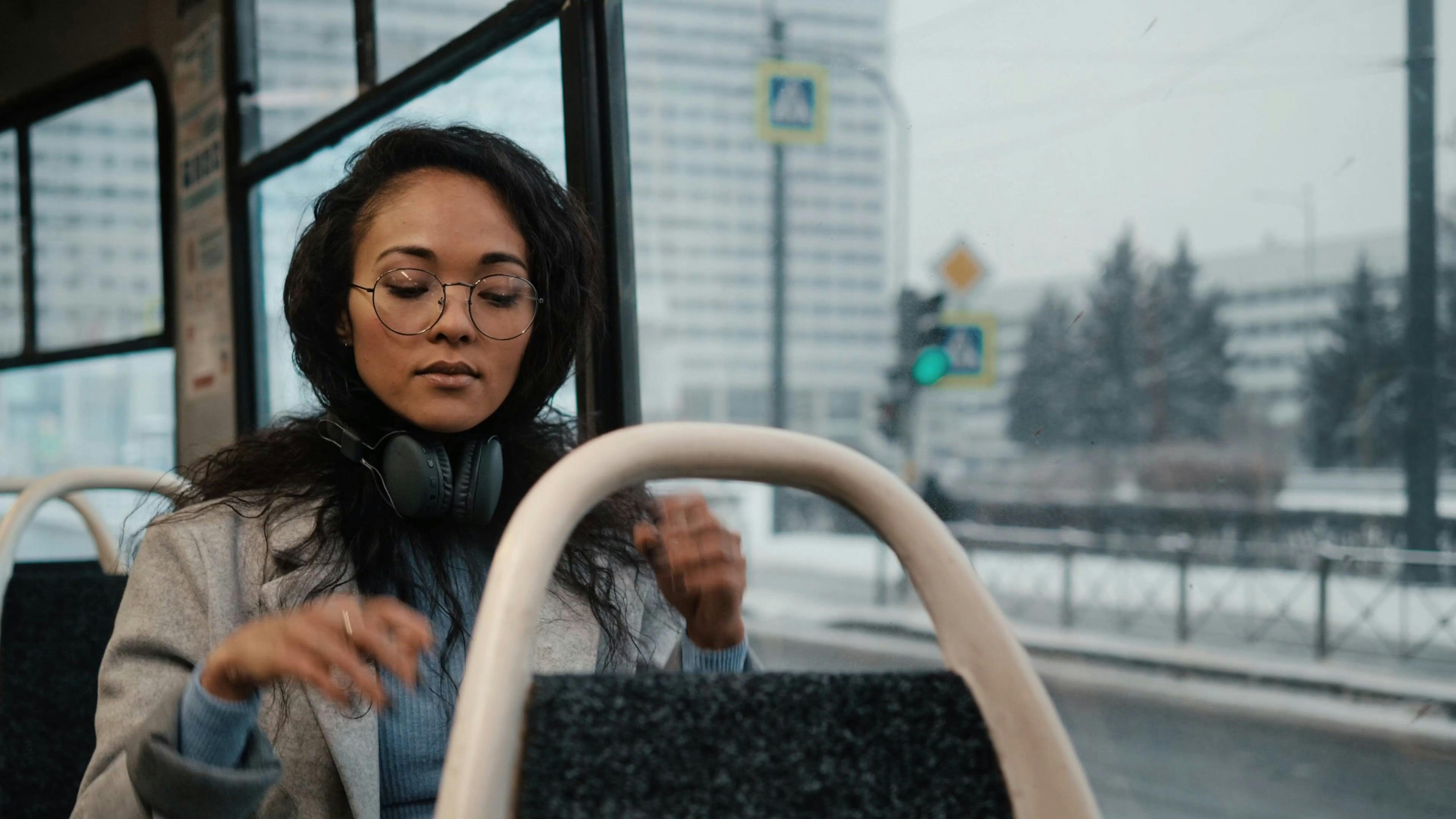 A Woman Listening to Music while Riding a Bus Free Stock Video Footage ...