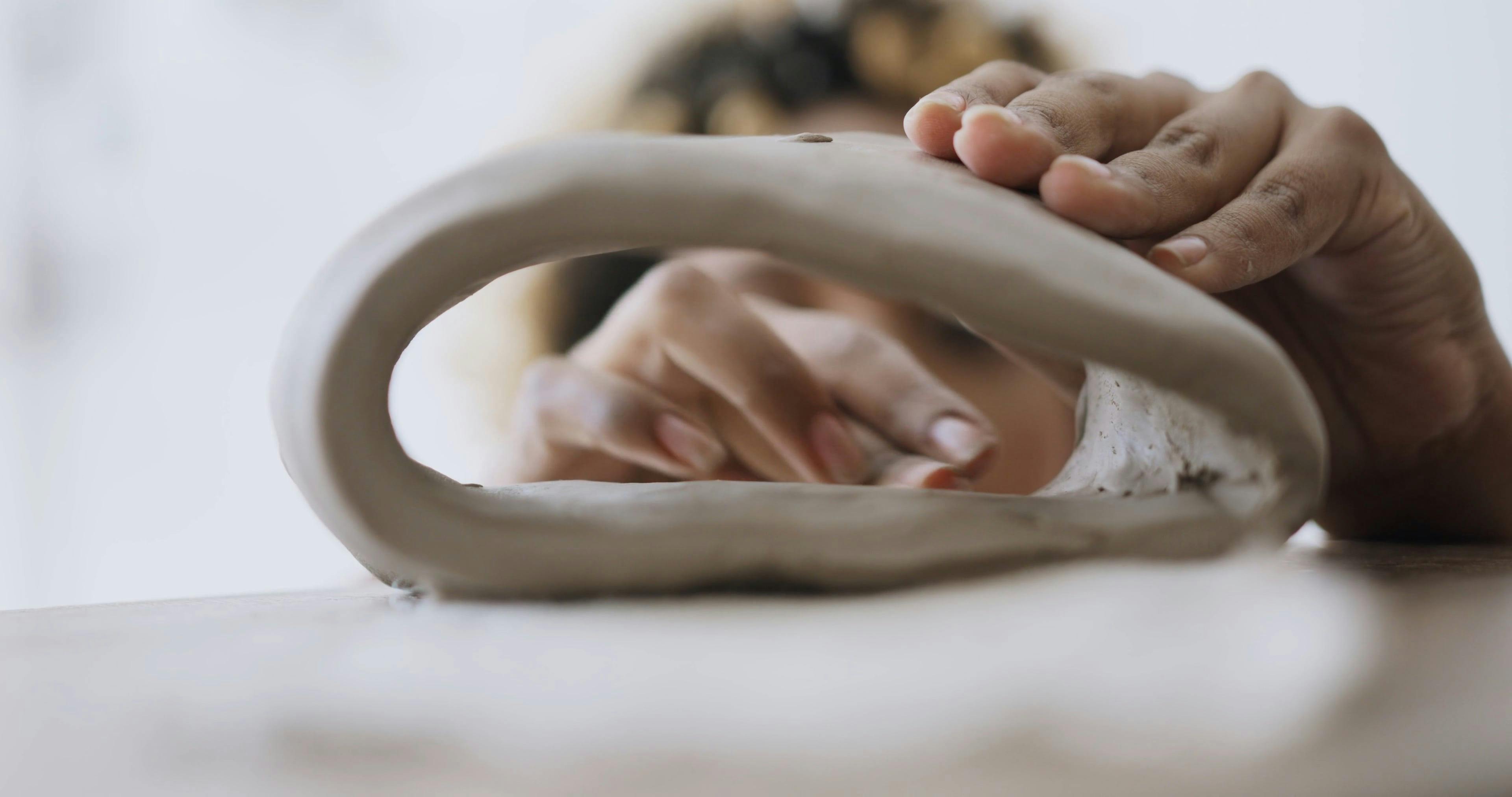 Close-Up Video of a Person Doing Clay Pottery · Free Stock Video