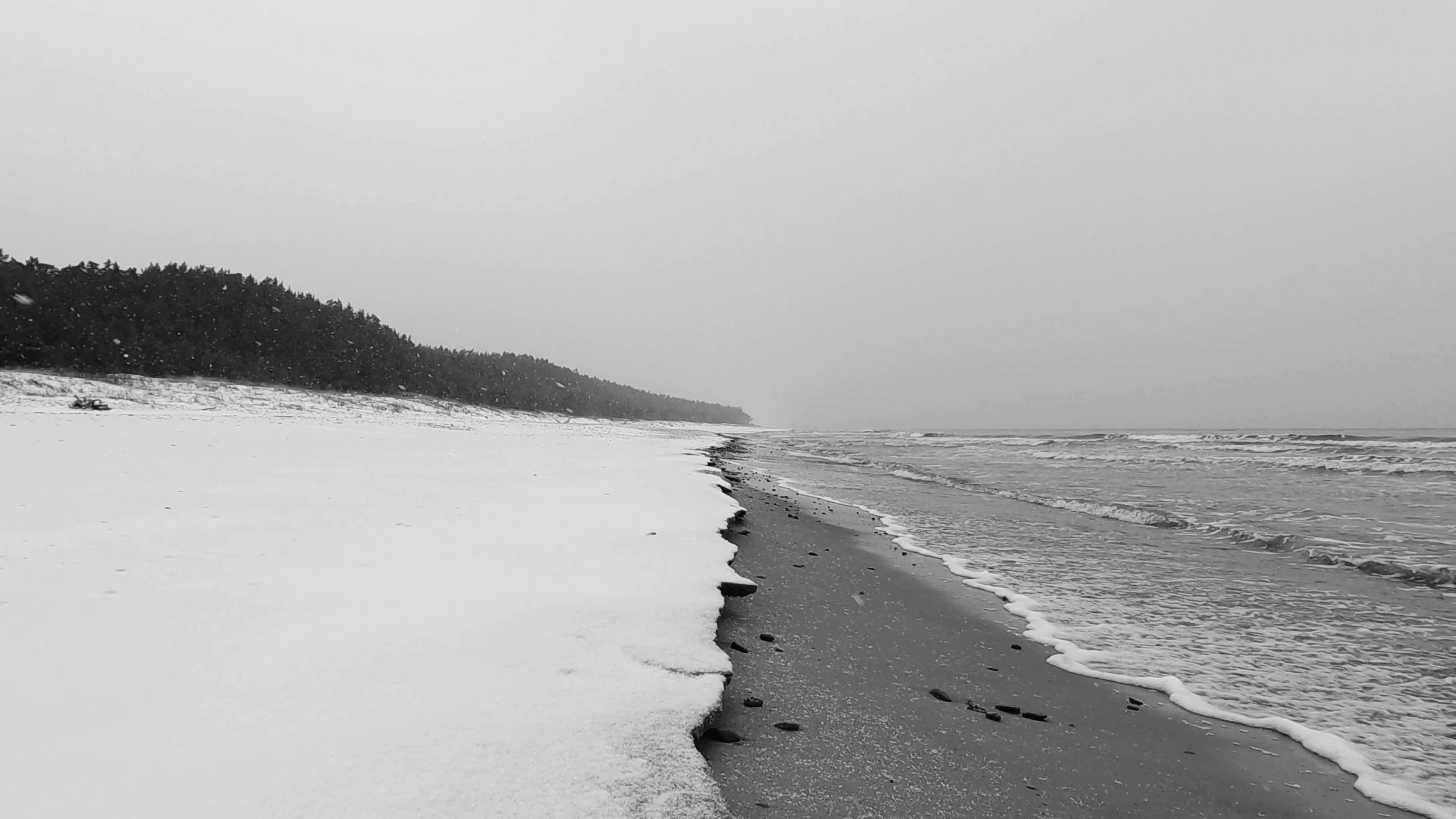 Wide Angle Shot of Shore with Snow · Free Stock Video