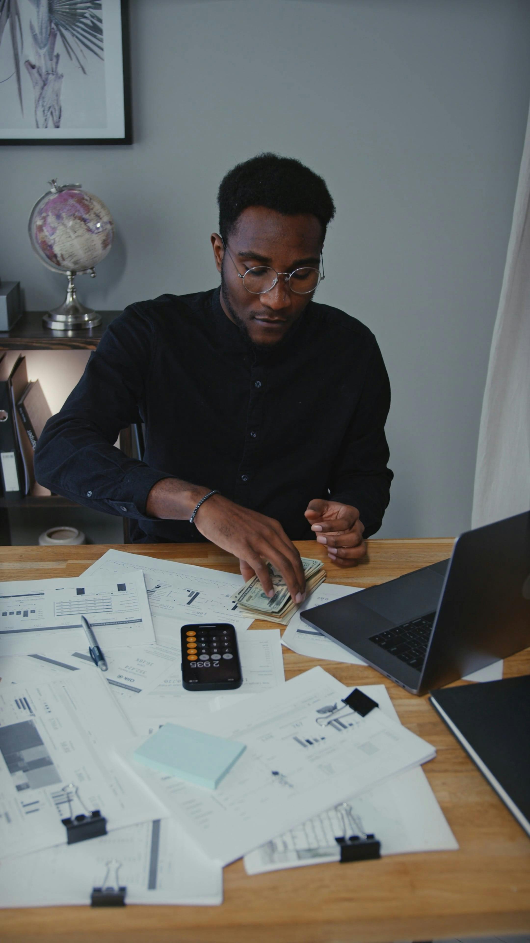 A Man Counting Money · Free Stock Video