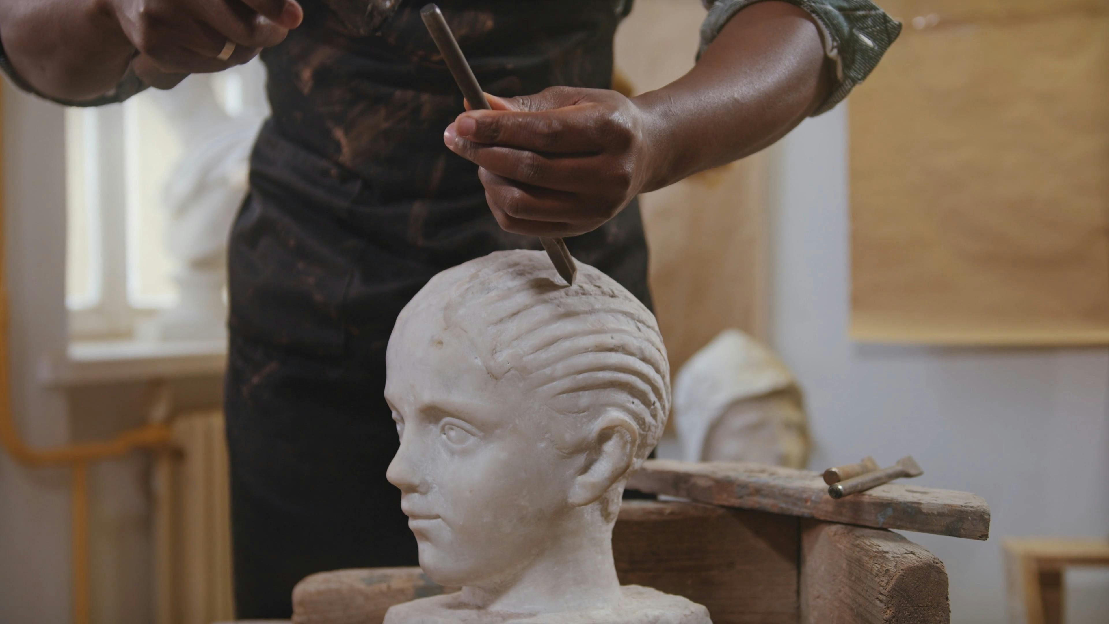 A Man Using Chisel to Make a Sculpture Free Stock Video Footage ...