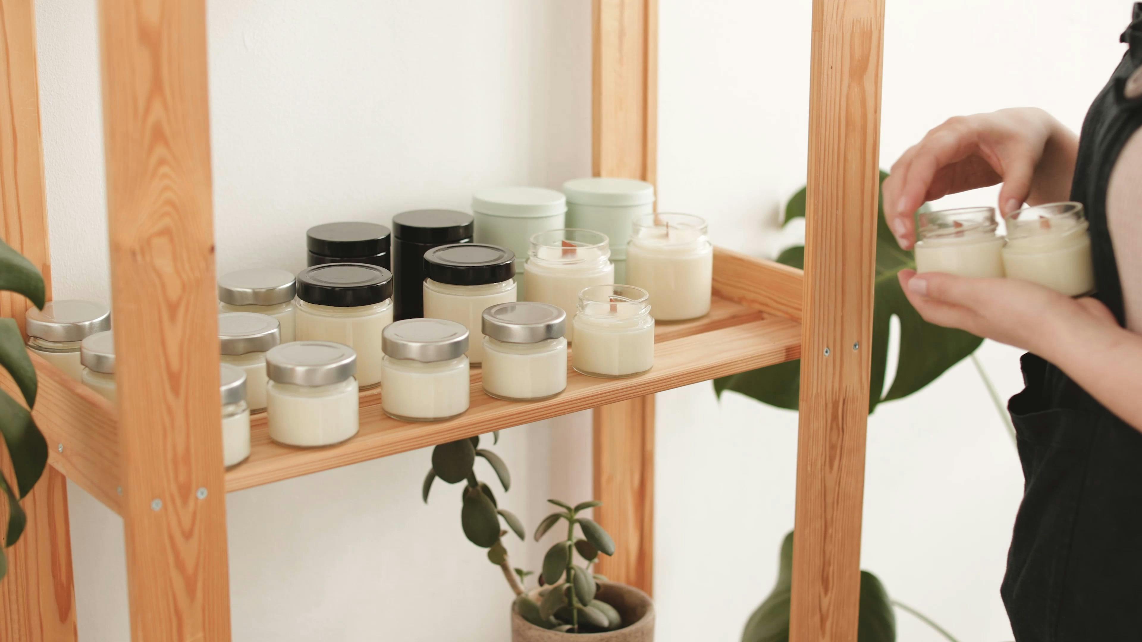 Woman Placing Candles In The Shelf Free Stock Video Footage, Royalty ...
