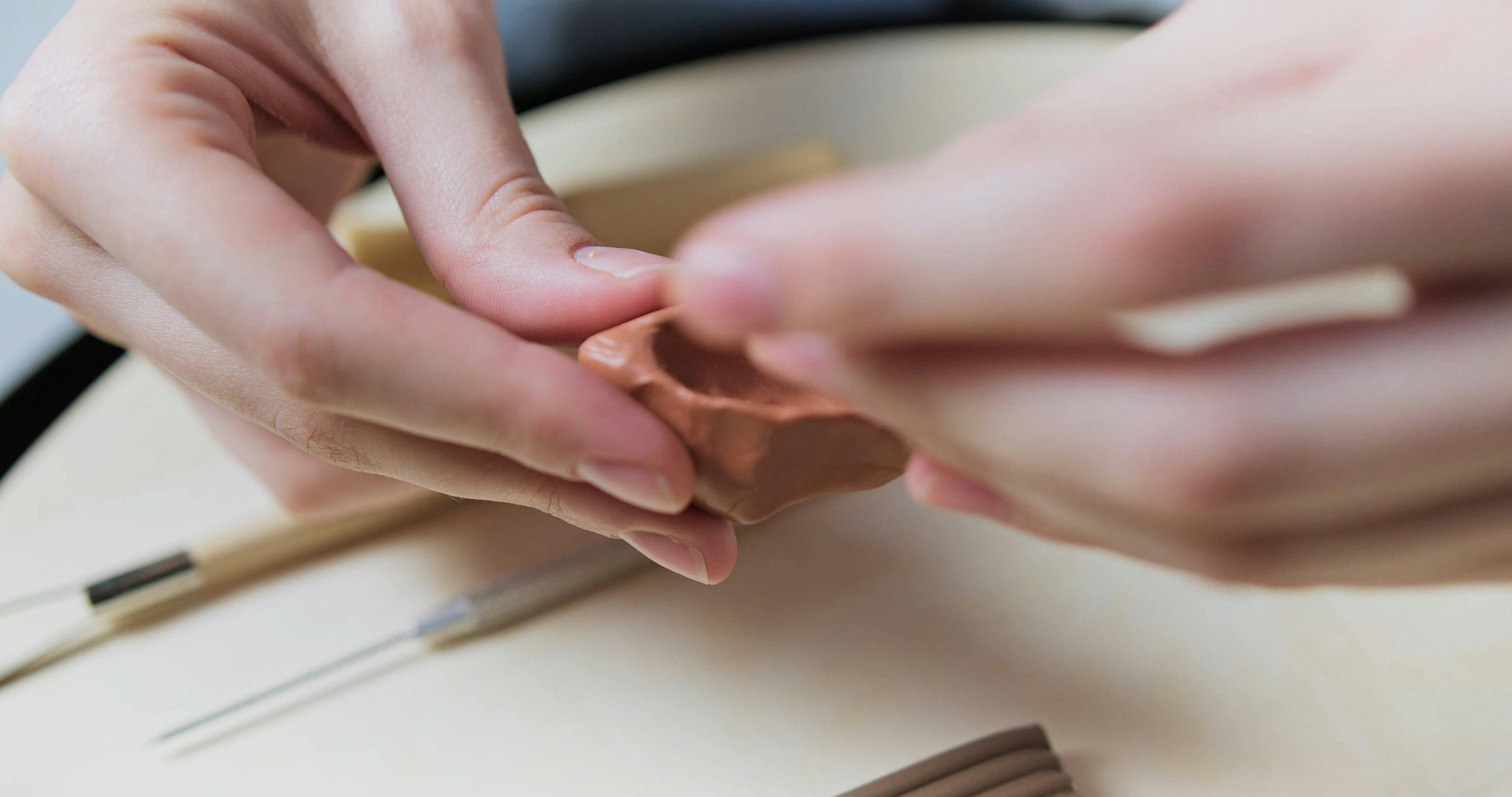 A Person Molding a Clay · Free Stock Video