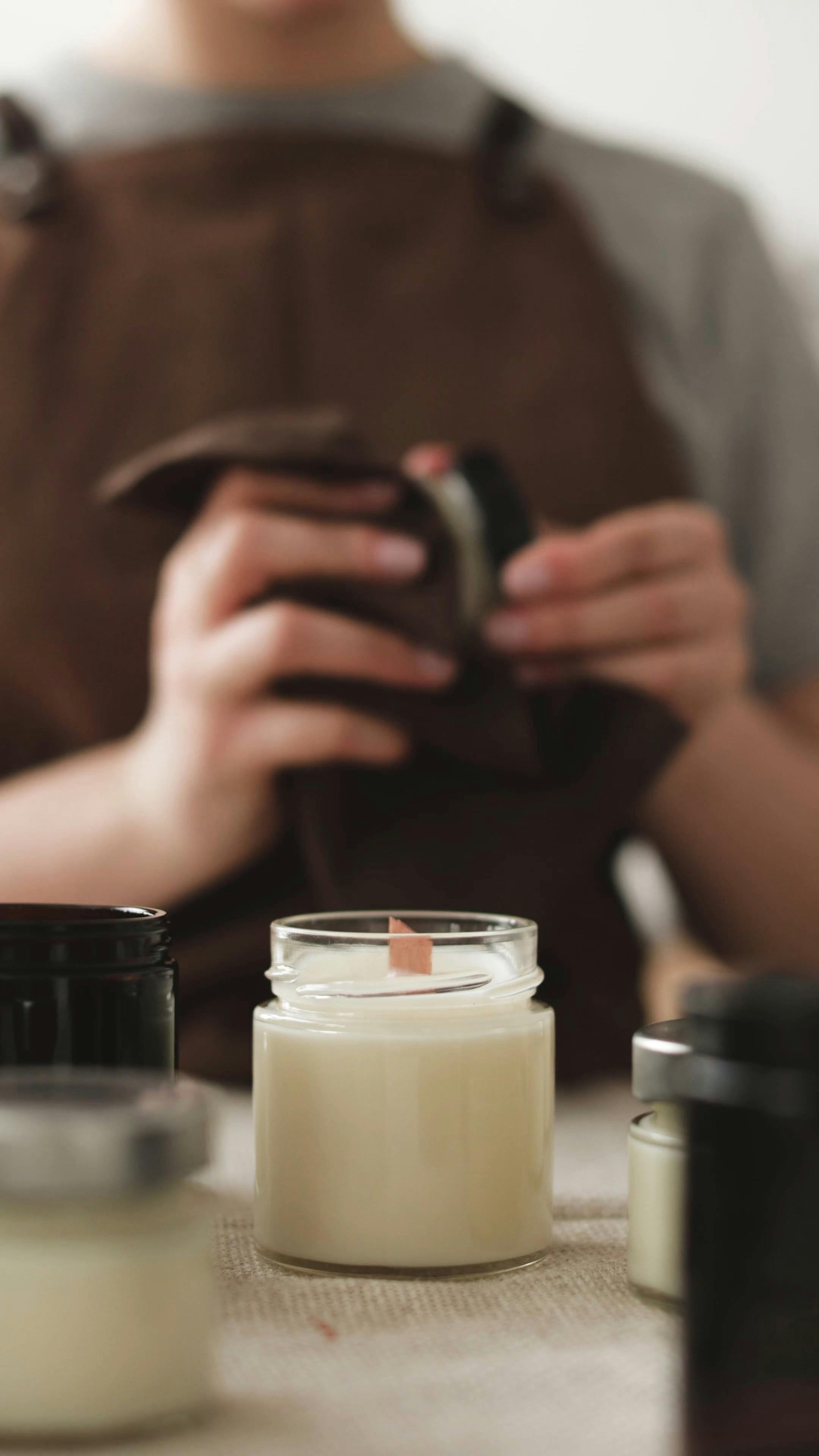 A Woman Smelling a Scented Candle Free Stock Video Footage, Royalty ...
