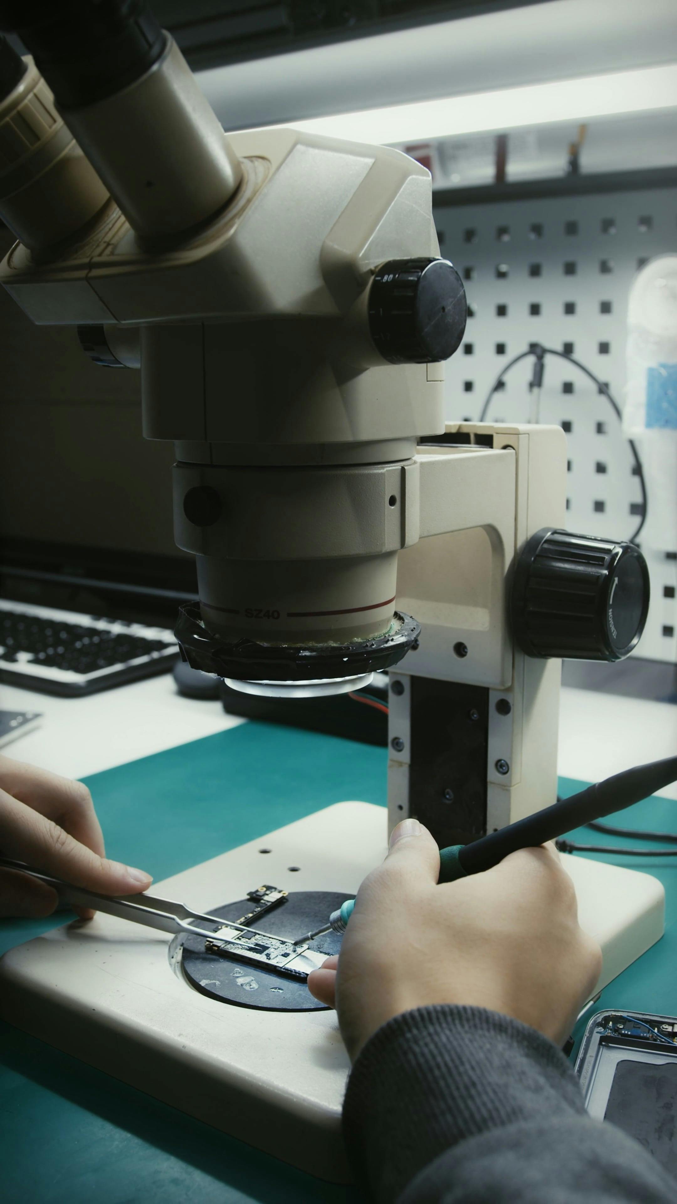 A Close-Up Video of a Person Using a Soldering Iron · Free Stock Video
