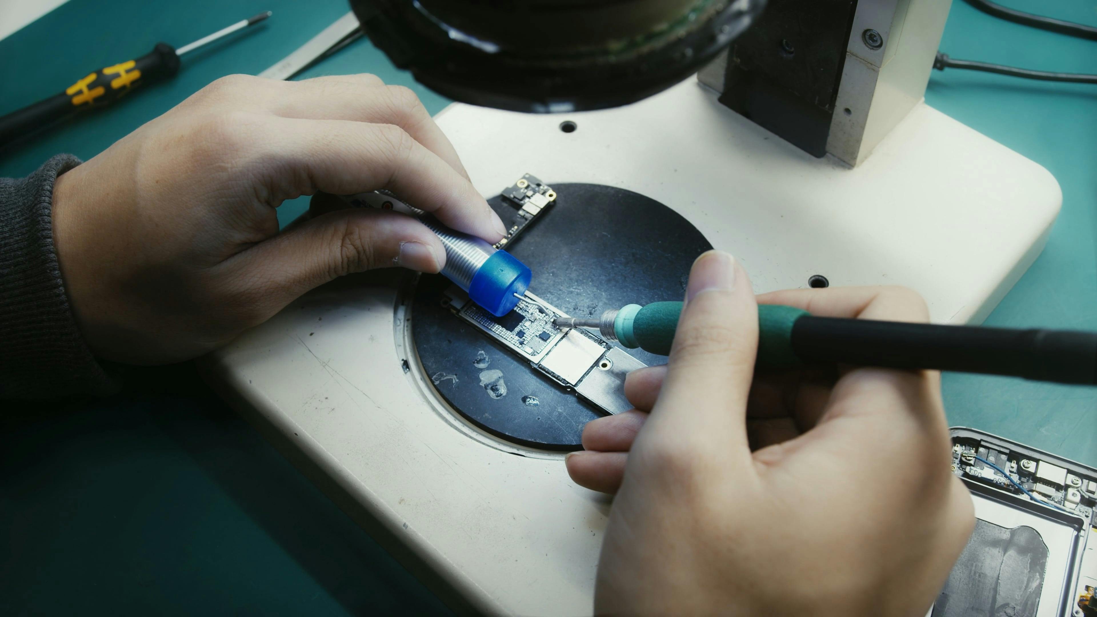 Video of a Person using Soldering Iron · Free Stock Video
