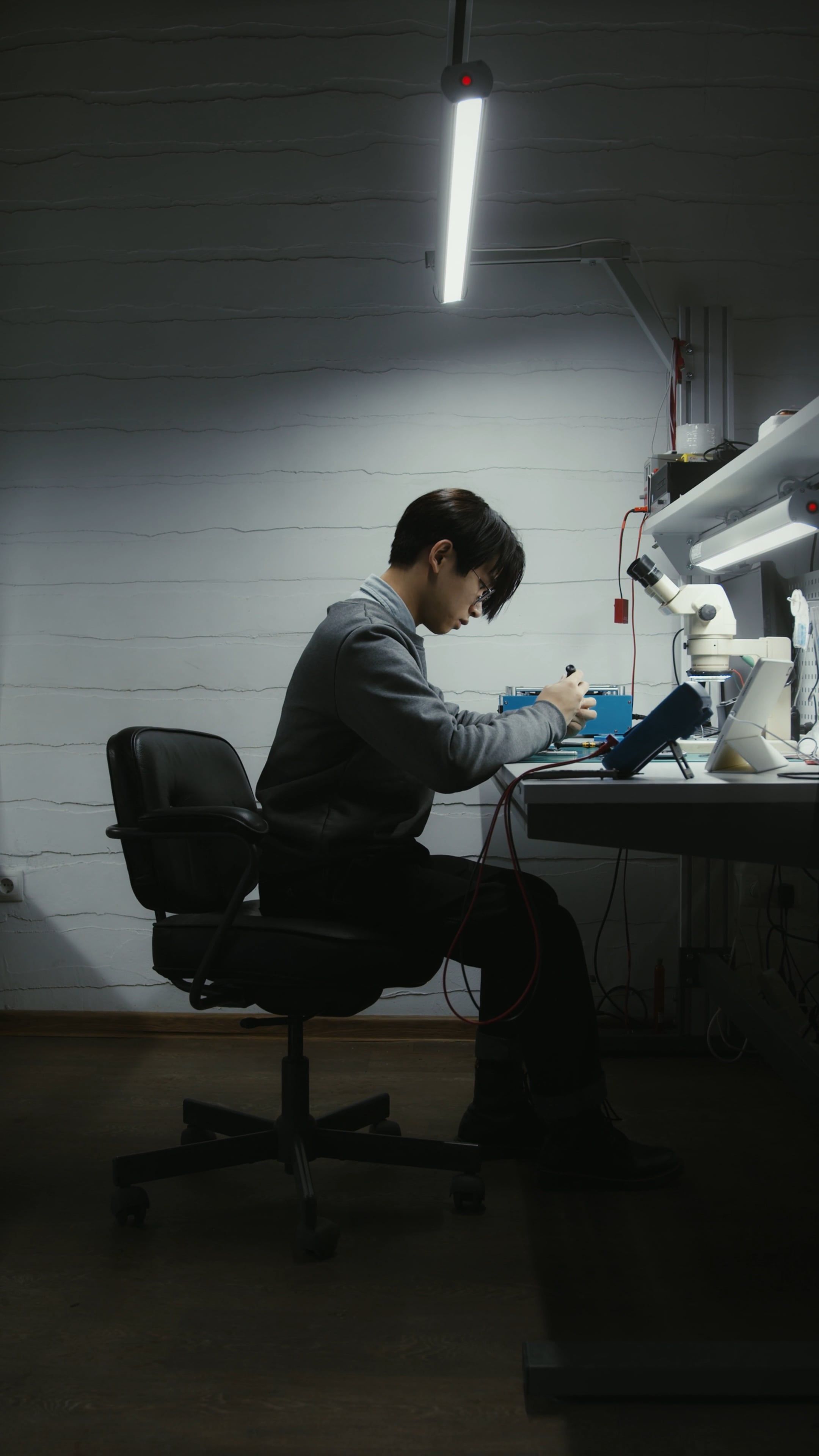 Young Man Repairing Electronic Device · Free Stock Video