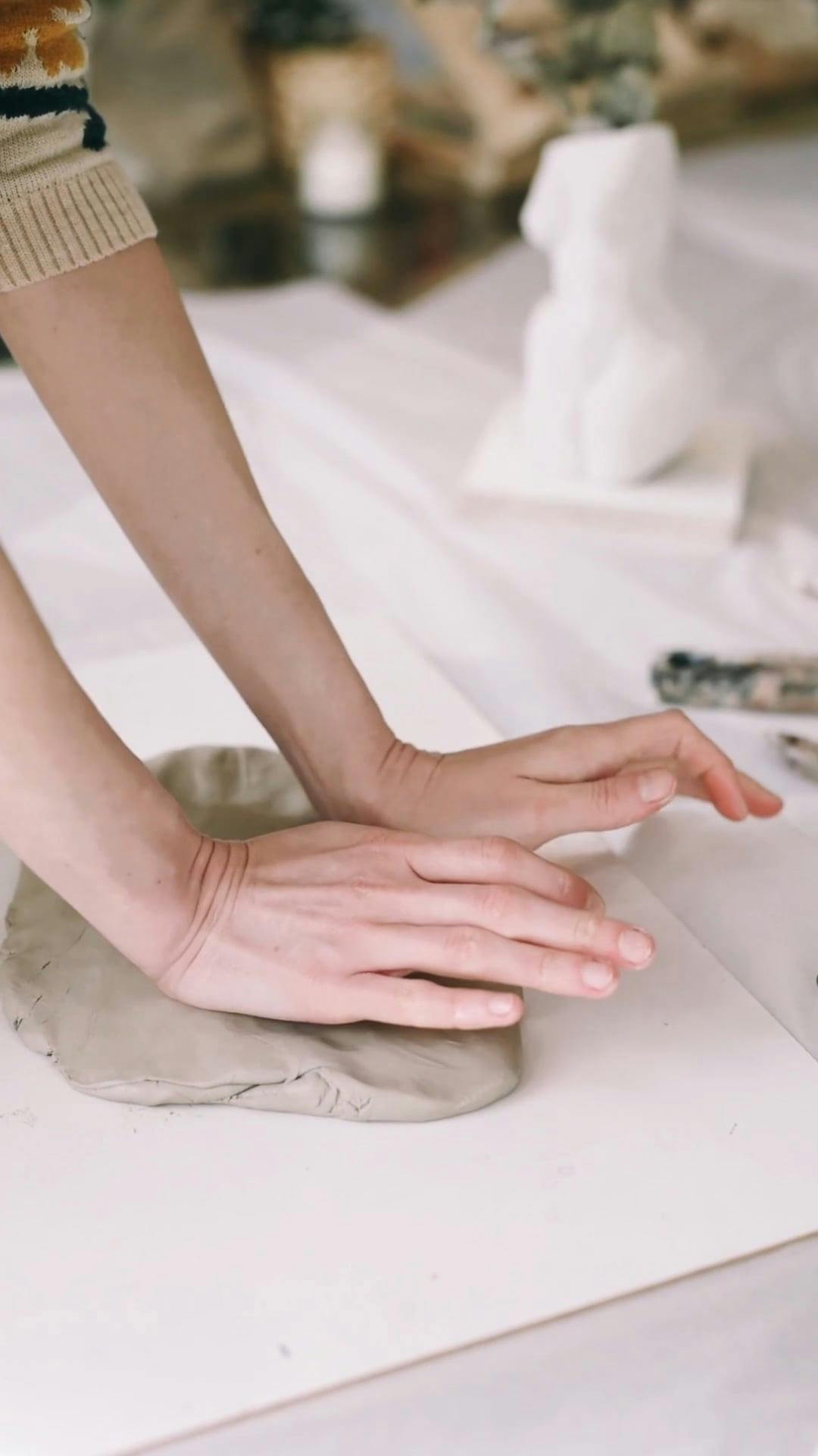 Person Flattening a Clay · Free Stock Video