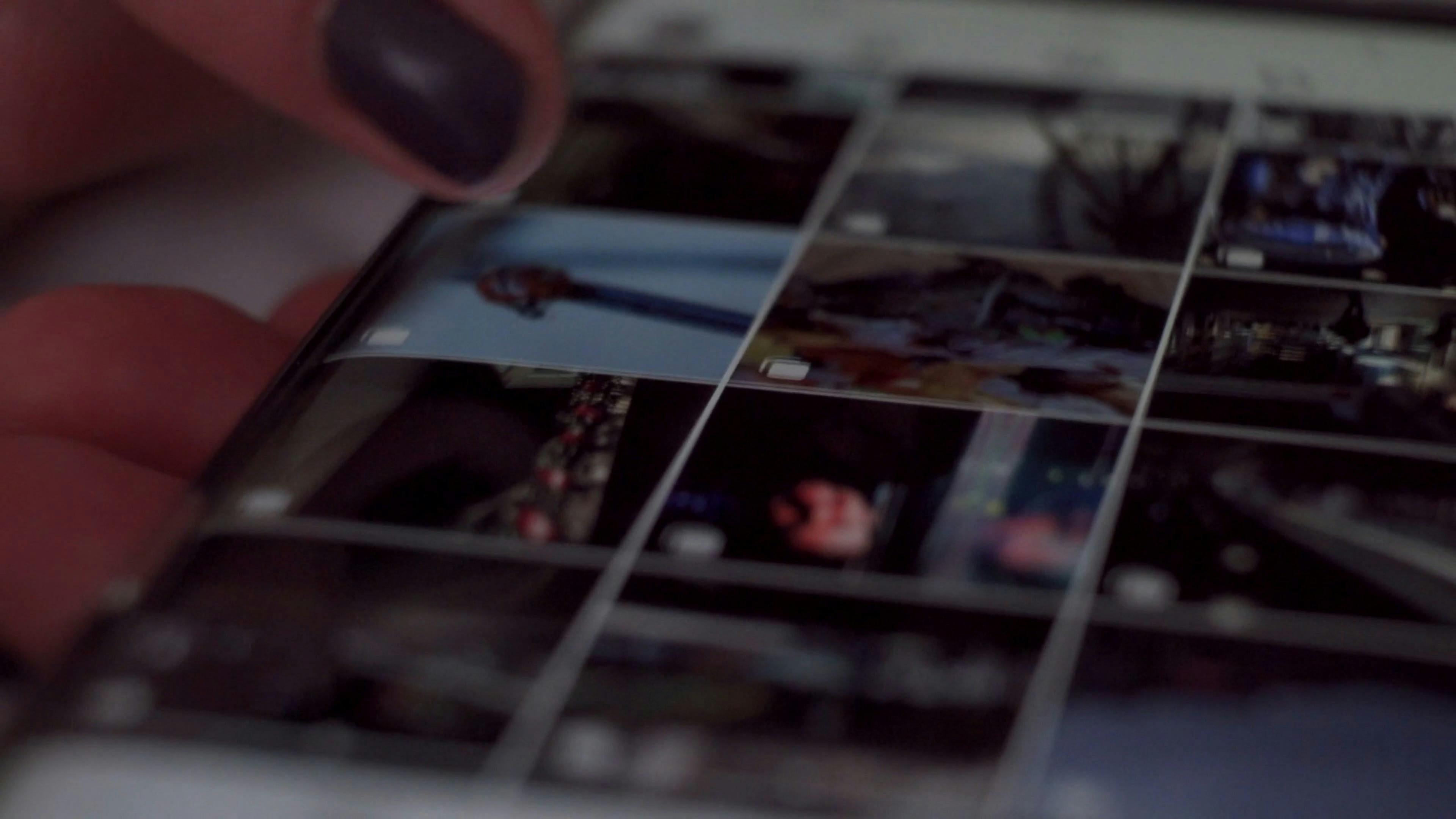 Close-Up View of a Person Scrolling through a Smartphone · Free Stock Video