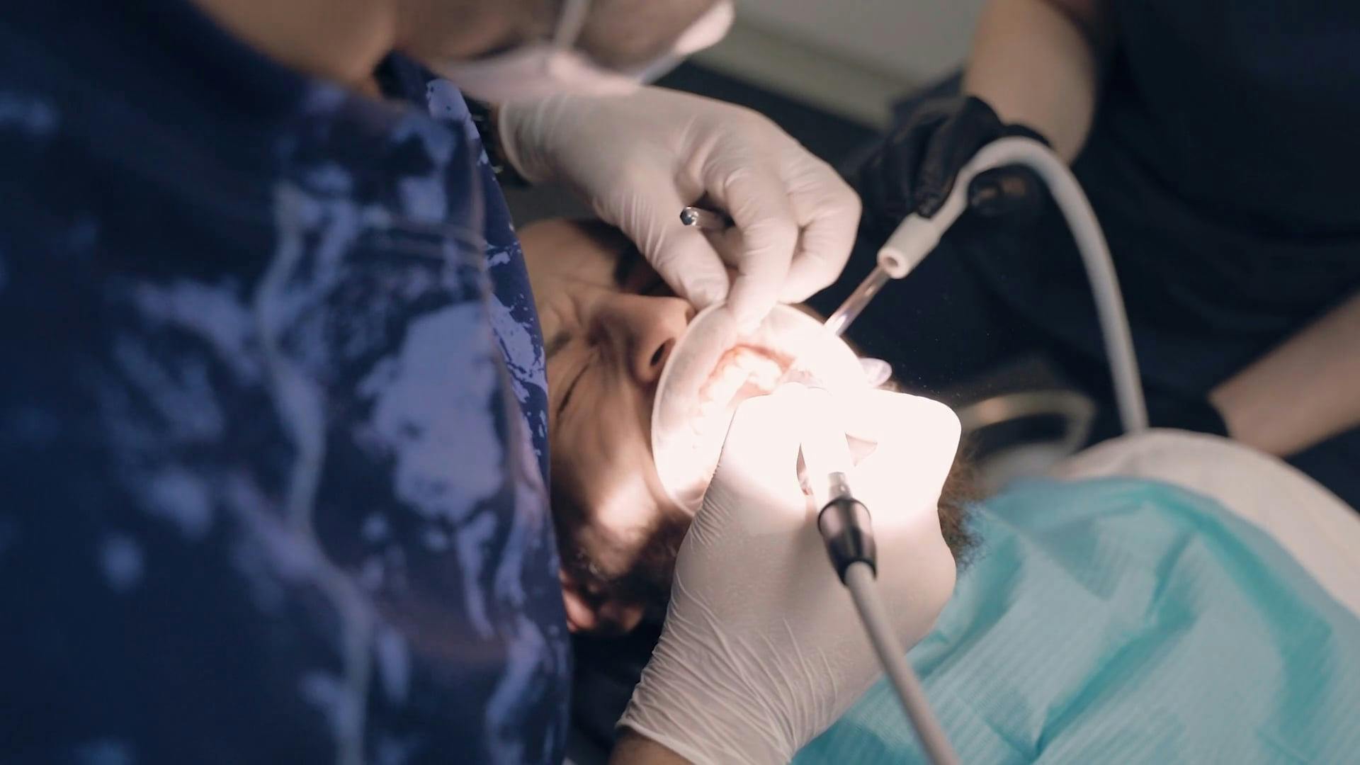Patient Getting Teeth Cleaned at Dental Clinic Free Stock Video Footage ...