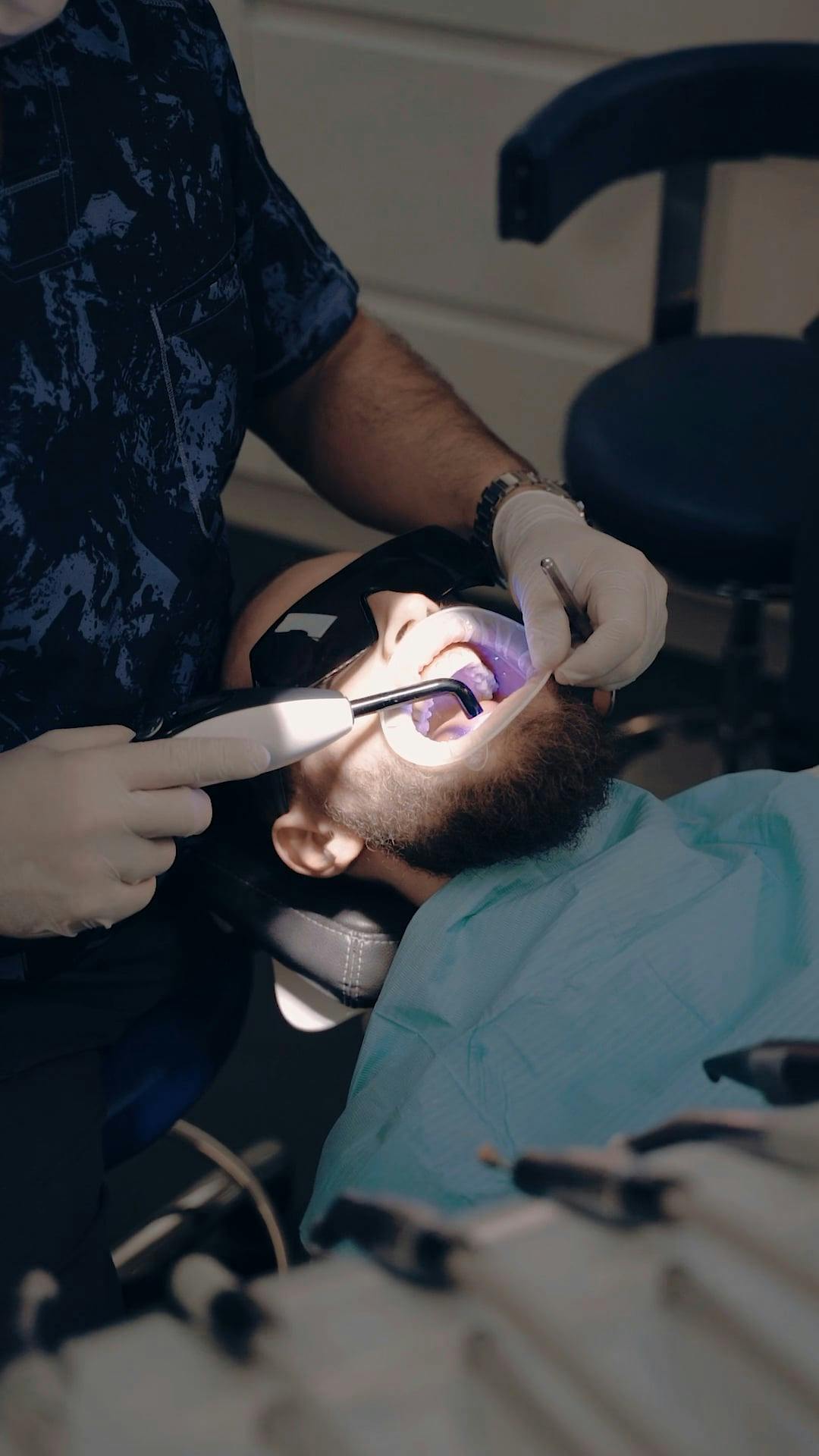 Dentist Examining Image of Open Mouth with Missing Teeth Free Stock ...