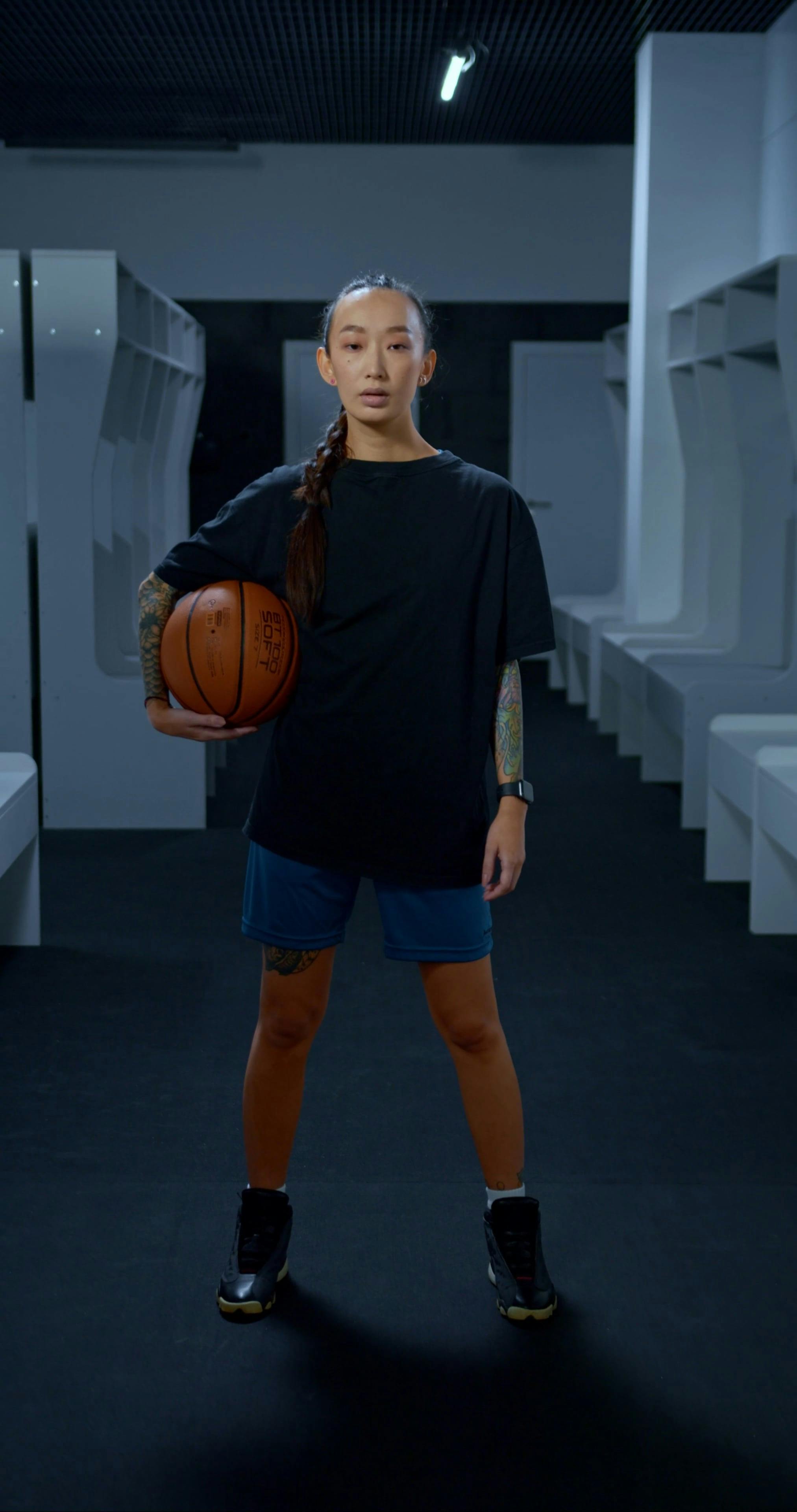 A Female Basketball Player In The Locker Room · Free Stock Video