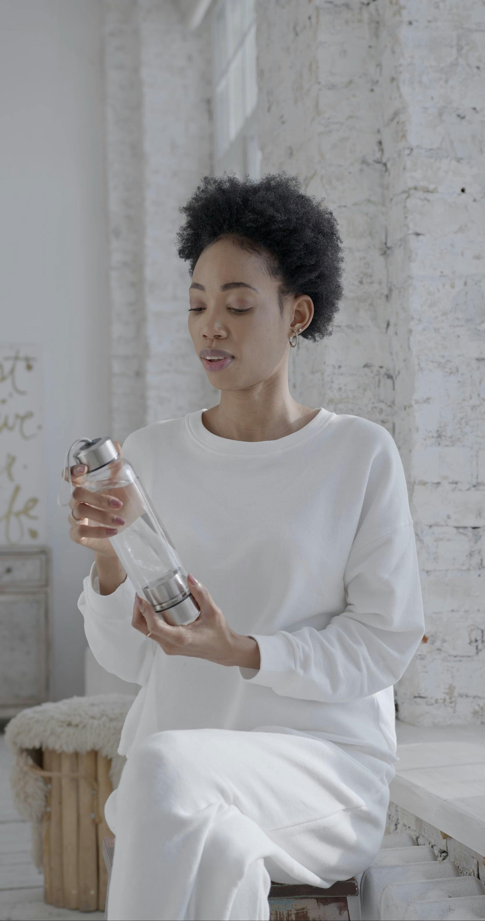 Woman Drinking Crystal-Infused Water Free Stock Video Footage, Royalty ...