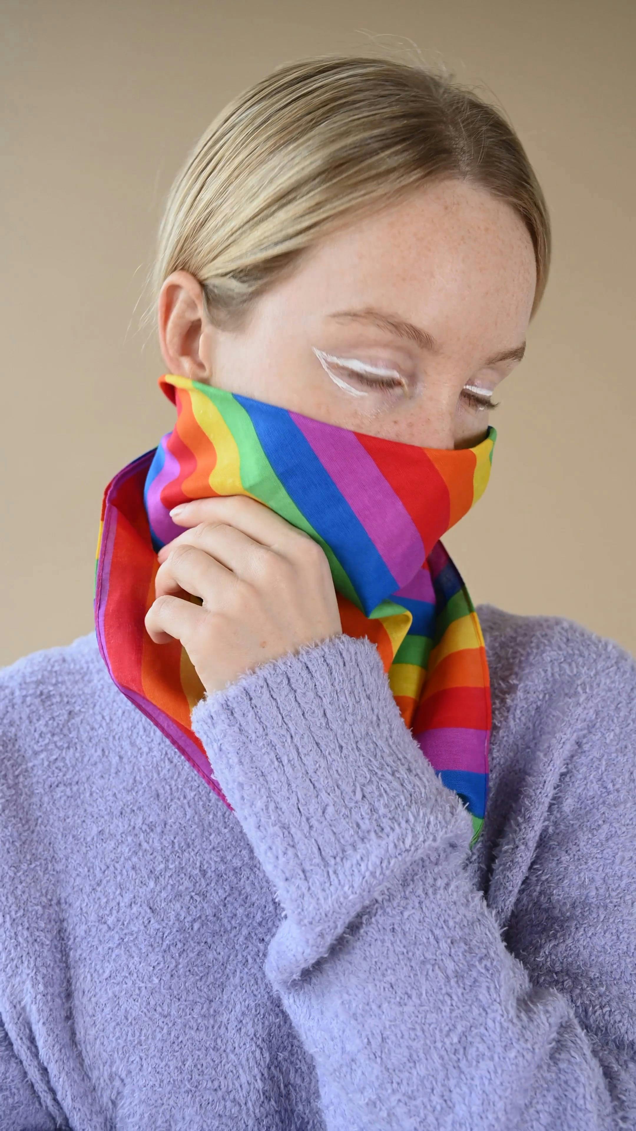 Woman Covering Her Mouth with a Rainbow Bandana · Free Stock Video