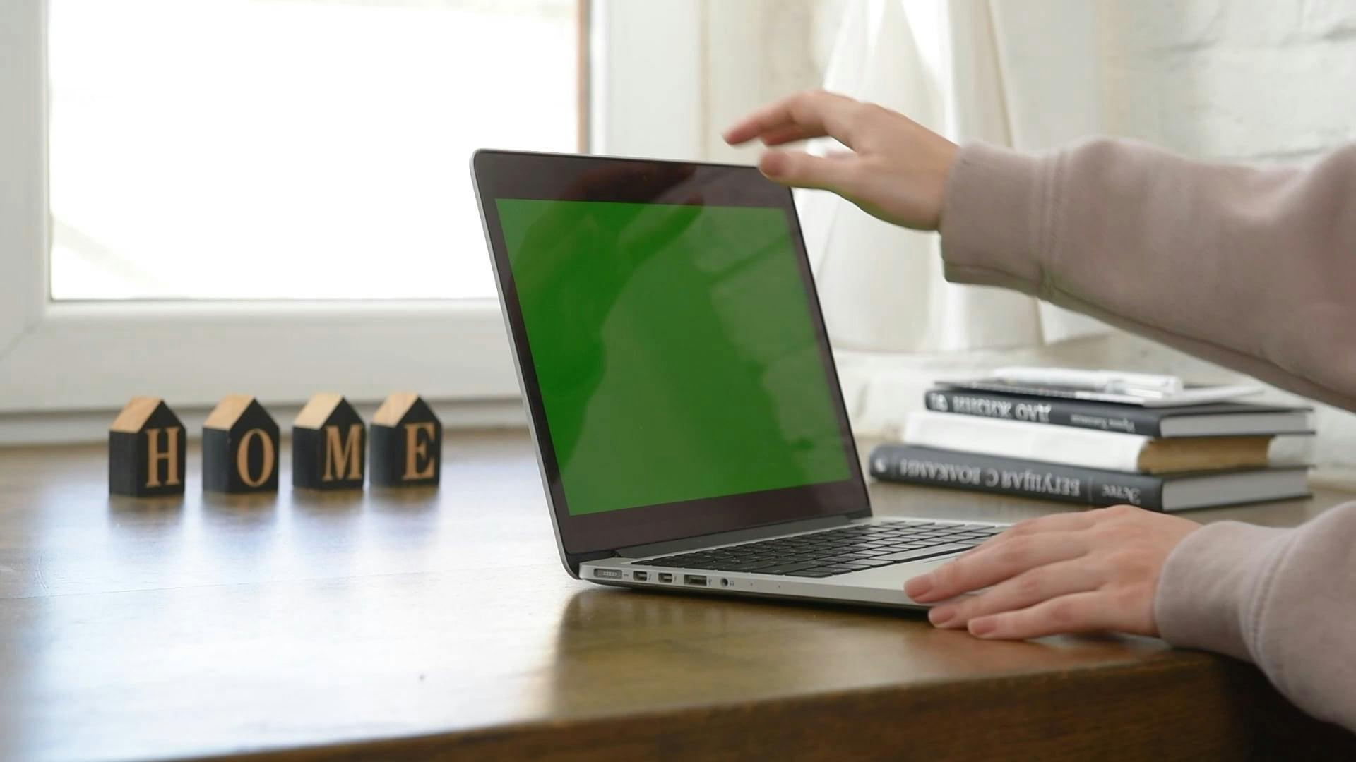 Person Closing a Laptop · Free Stock Video