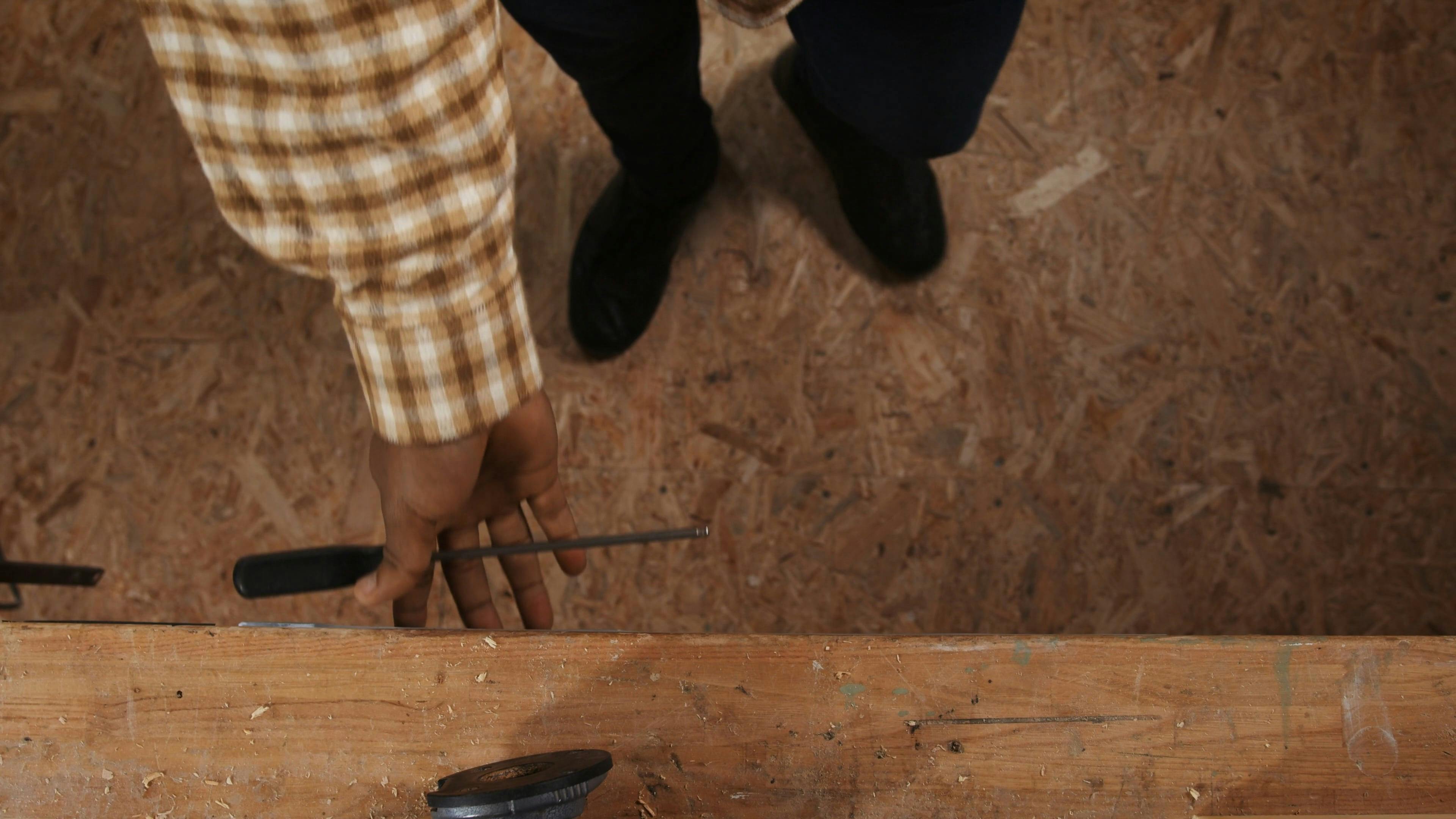 High Angle Shot of Man Getting a Drill Head · Free Stock Video