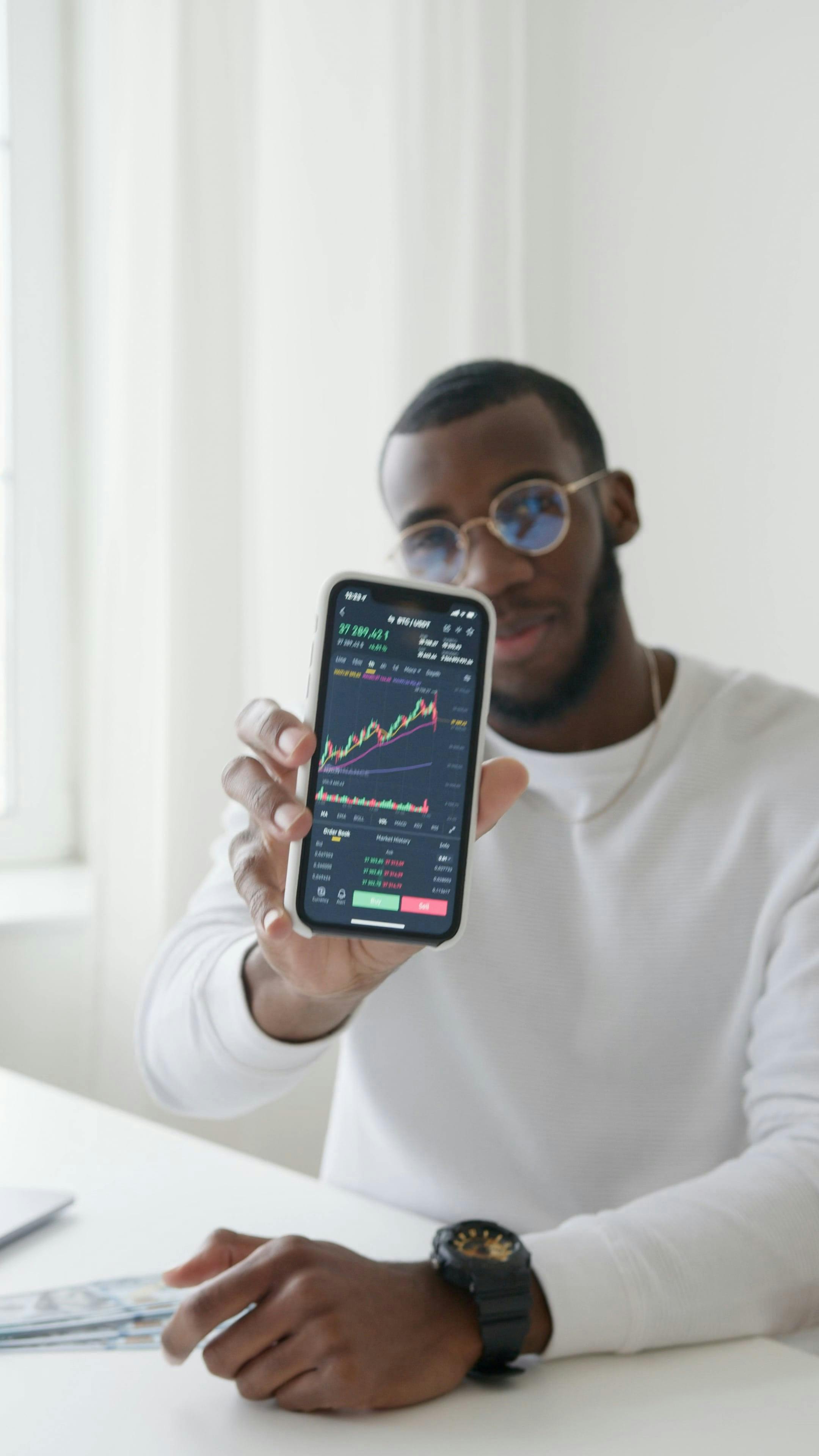 A Person Looking at the Stock Analysis Using a Pen · Free Stock Video