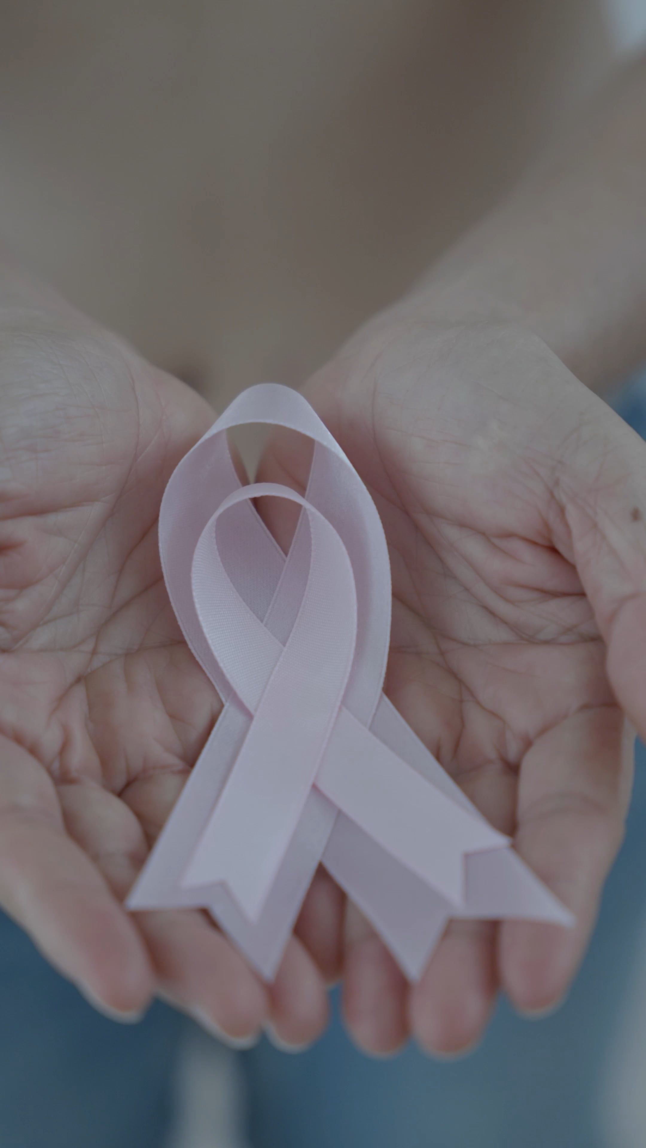 A Person Holding a Ribbon · Free Stock Video