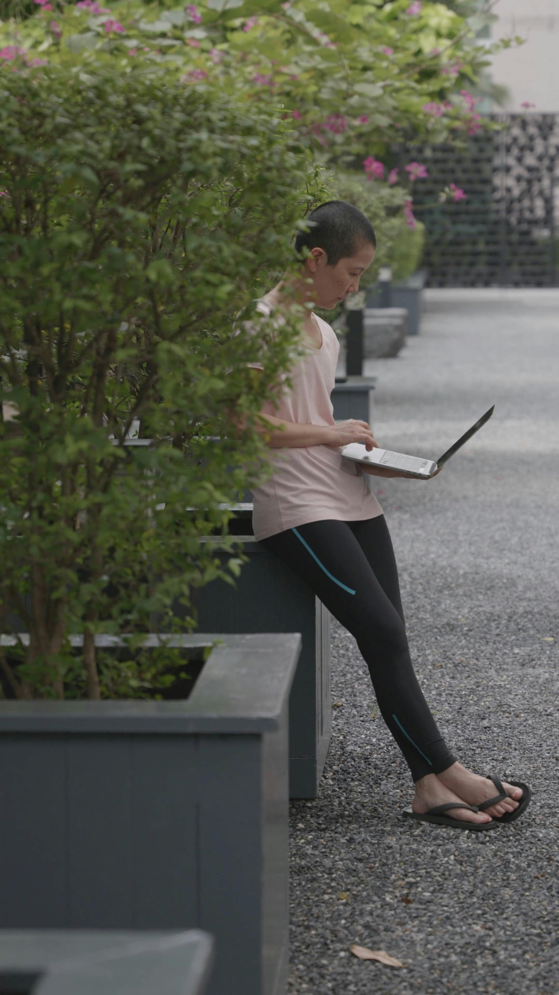 A Person Using A Personal Computer Outside Videos, Download The BEST ...