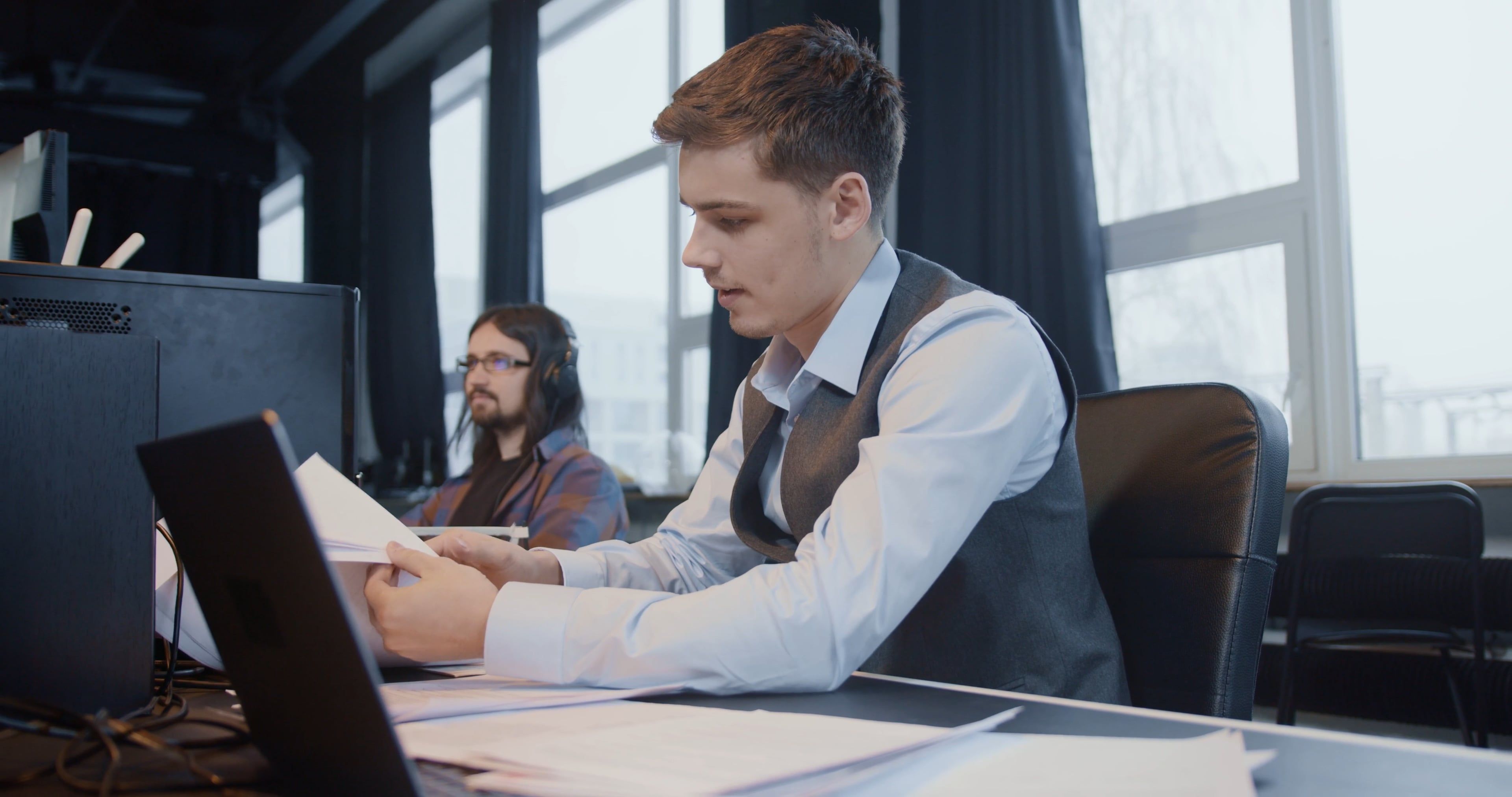 Young Worker Looking Through Papers in Office Free Stock Video Footage ...