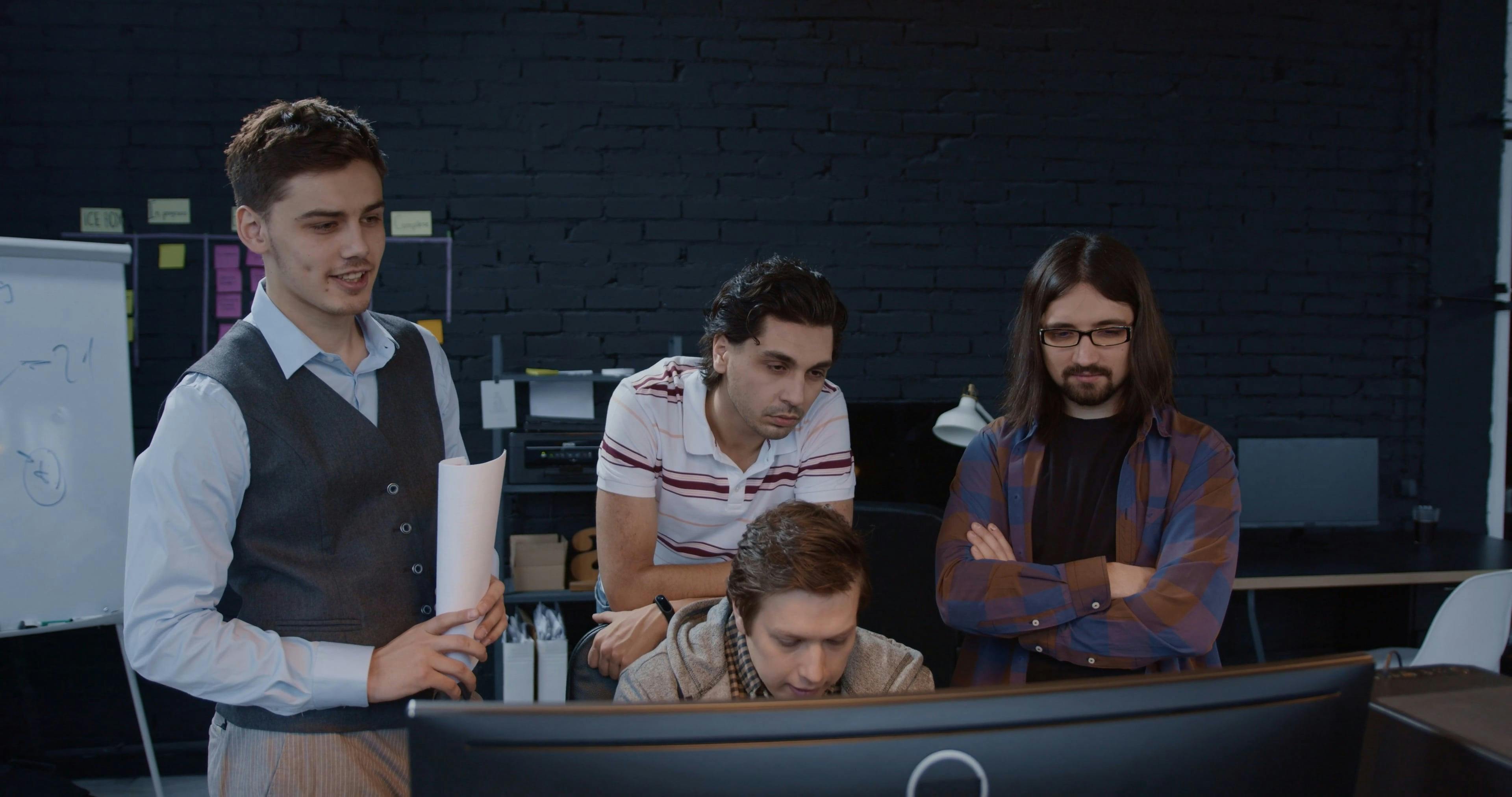 Colleagues Helping at Work · Free Stock Video