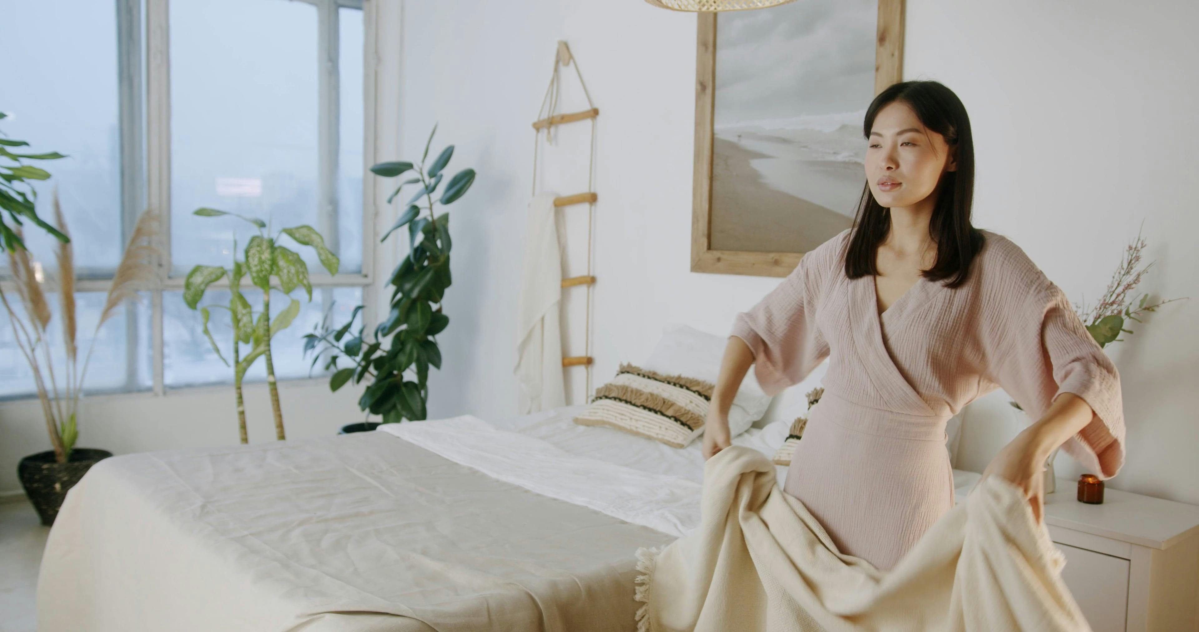 Woman Shaking off the Dust From a Blanket Free Stock Video Footage ...