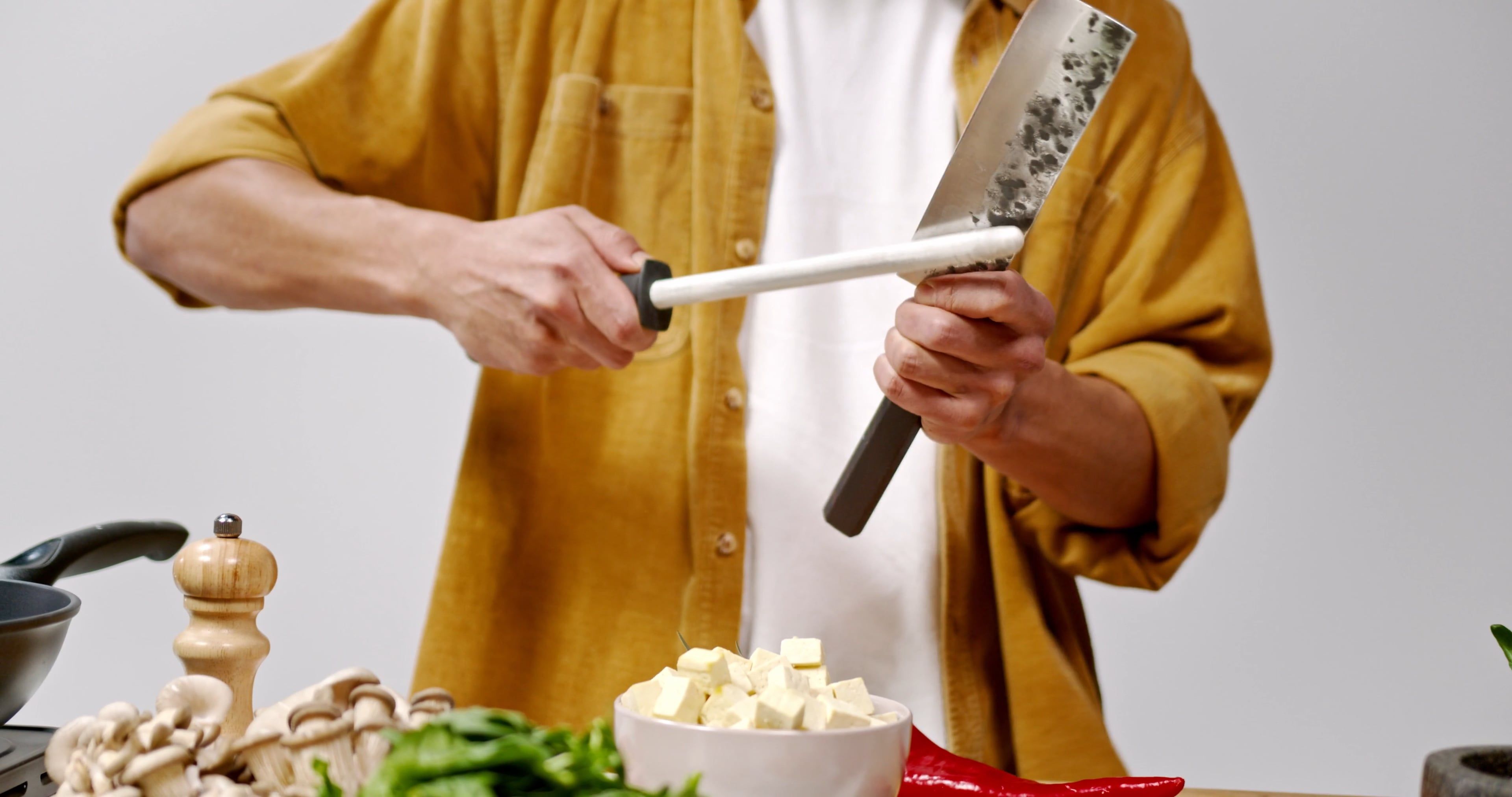 A Man Sharpening the Knife · Free Stock Video