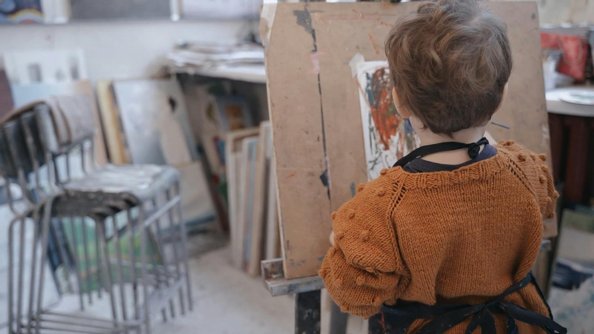 A Child Learning to Paint · Free Stock Video