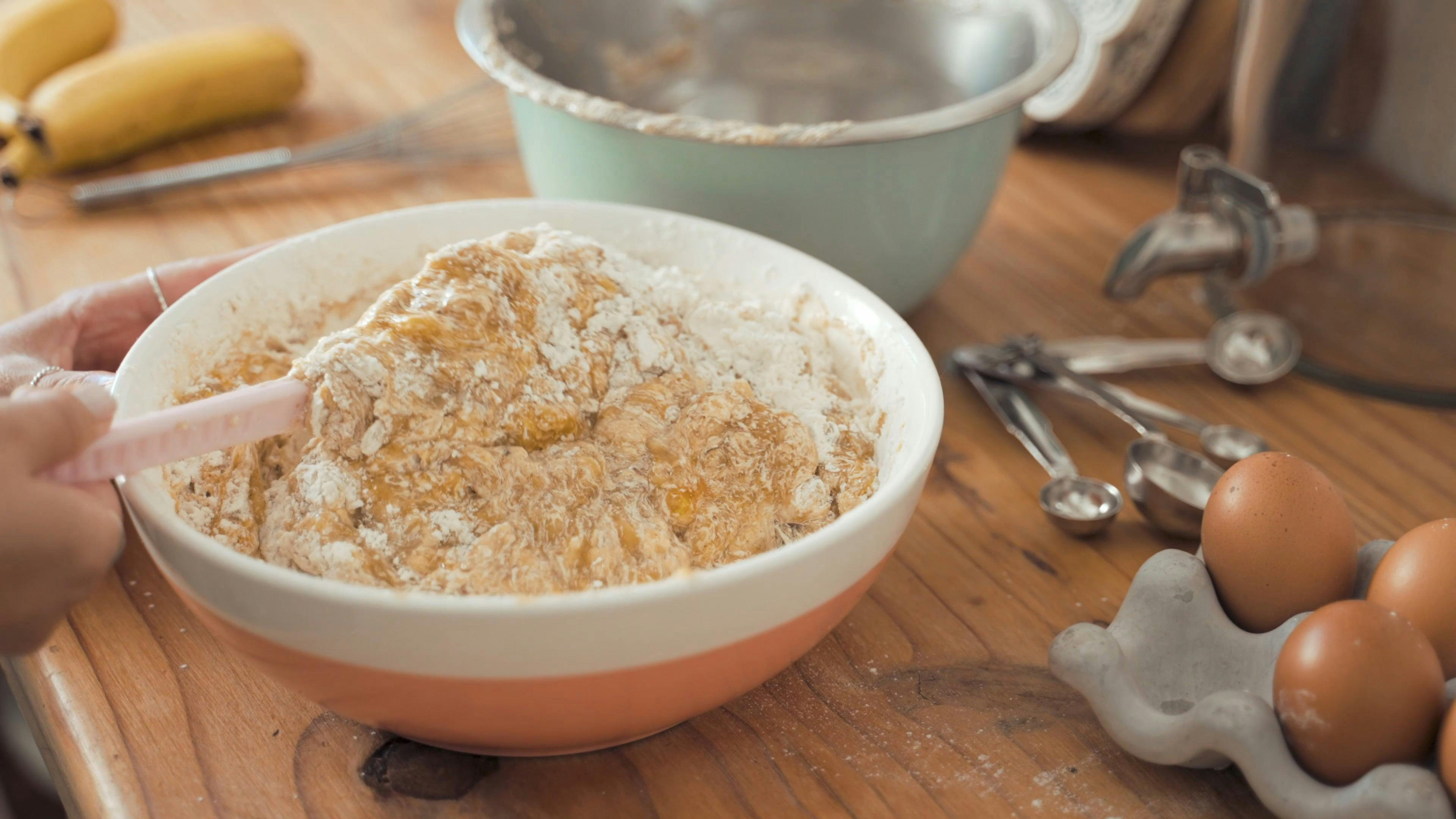 Two Women Preparing A Chocolate Batter For Baking Free Stock Video ...
