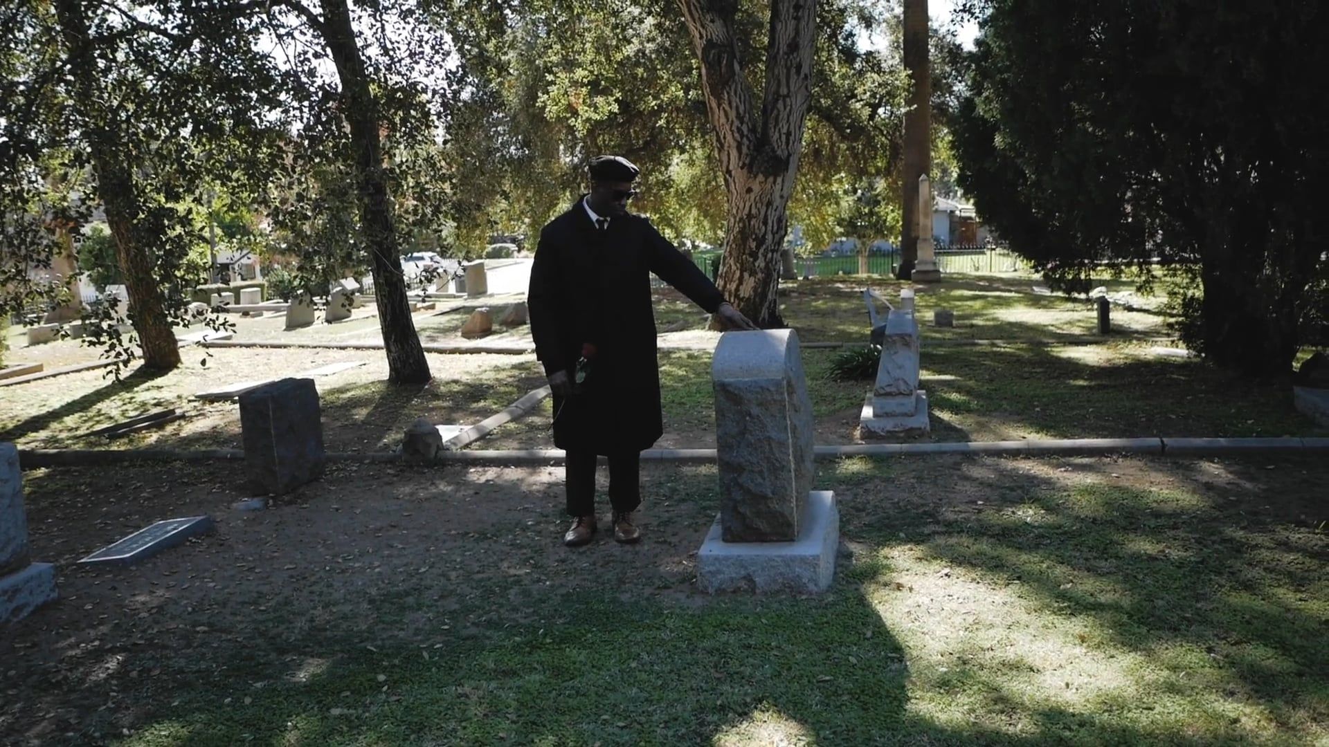 A Grieving Man Touching a Tombstone at the Cemetery Free Stock Video ...