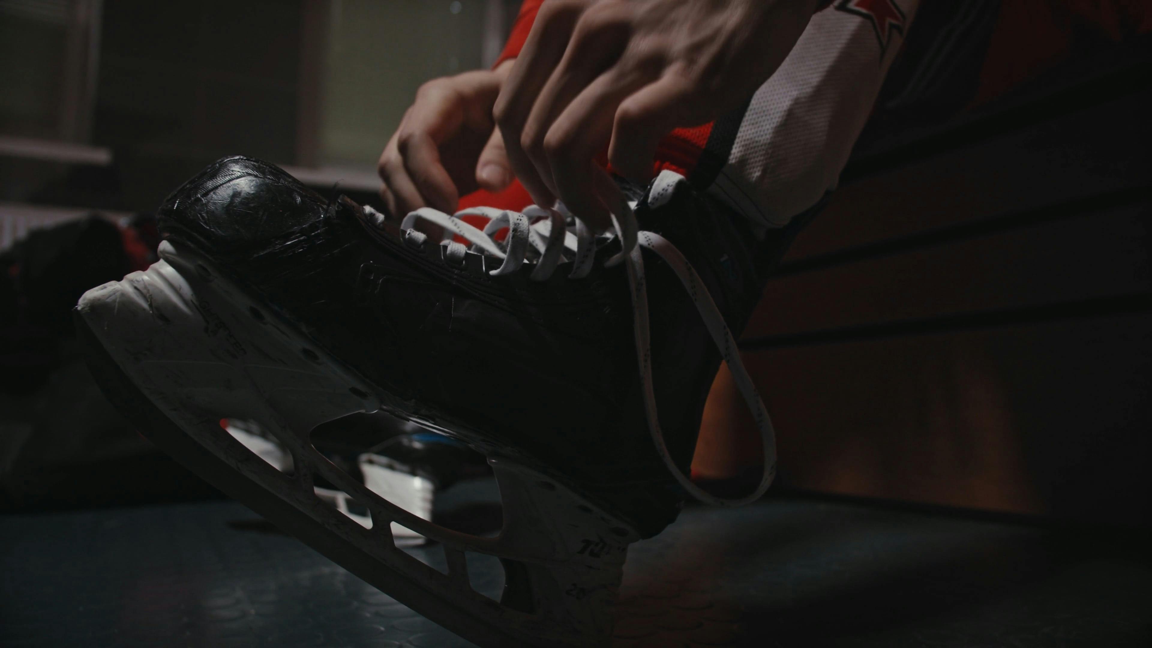 A Person Tightening and Tying Hockey Skates Free Stock Video Footage ...