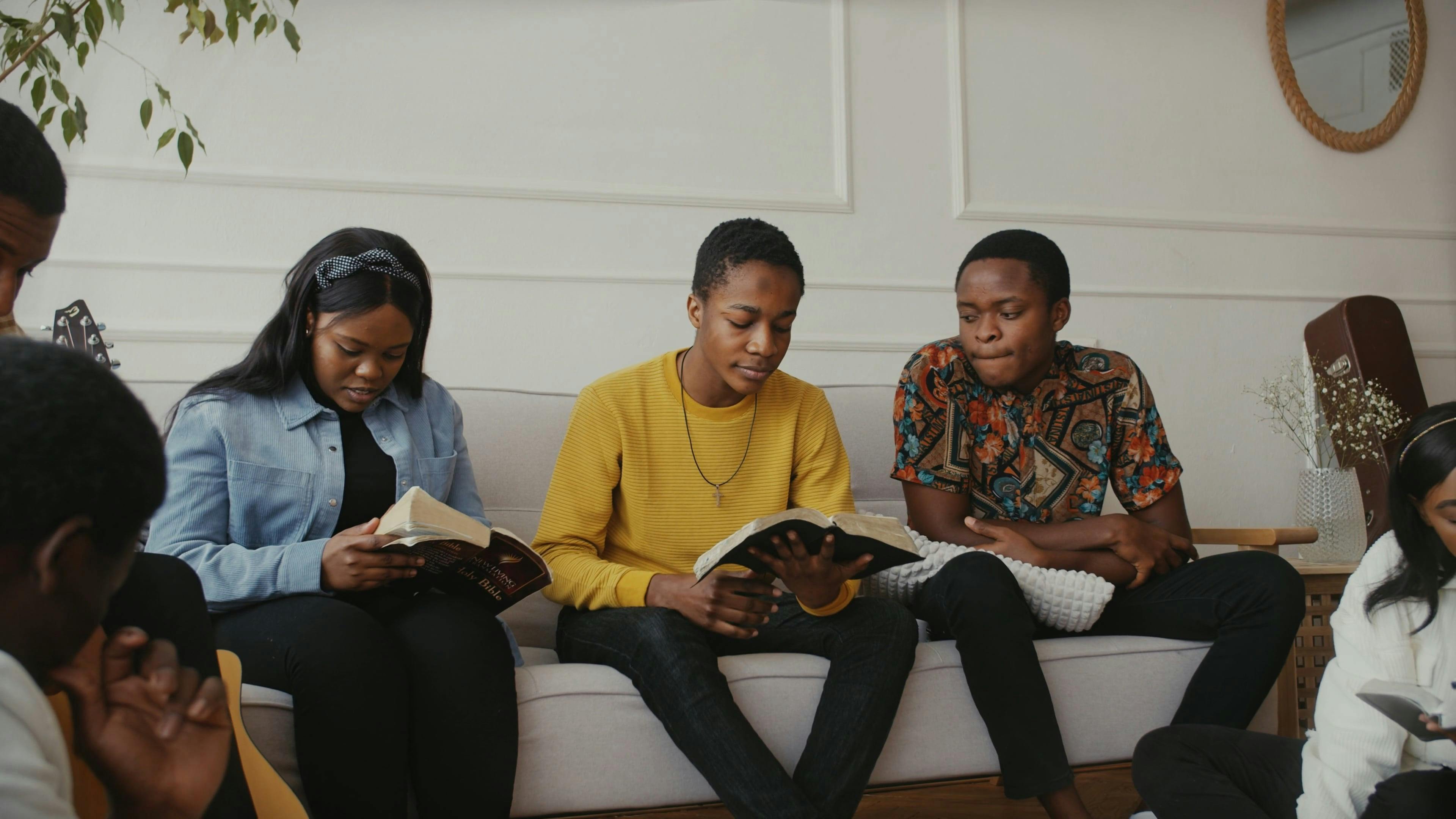 A Man Reading Book while Others are Listening Free Stock Video Footage ...