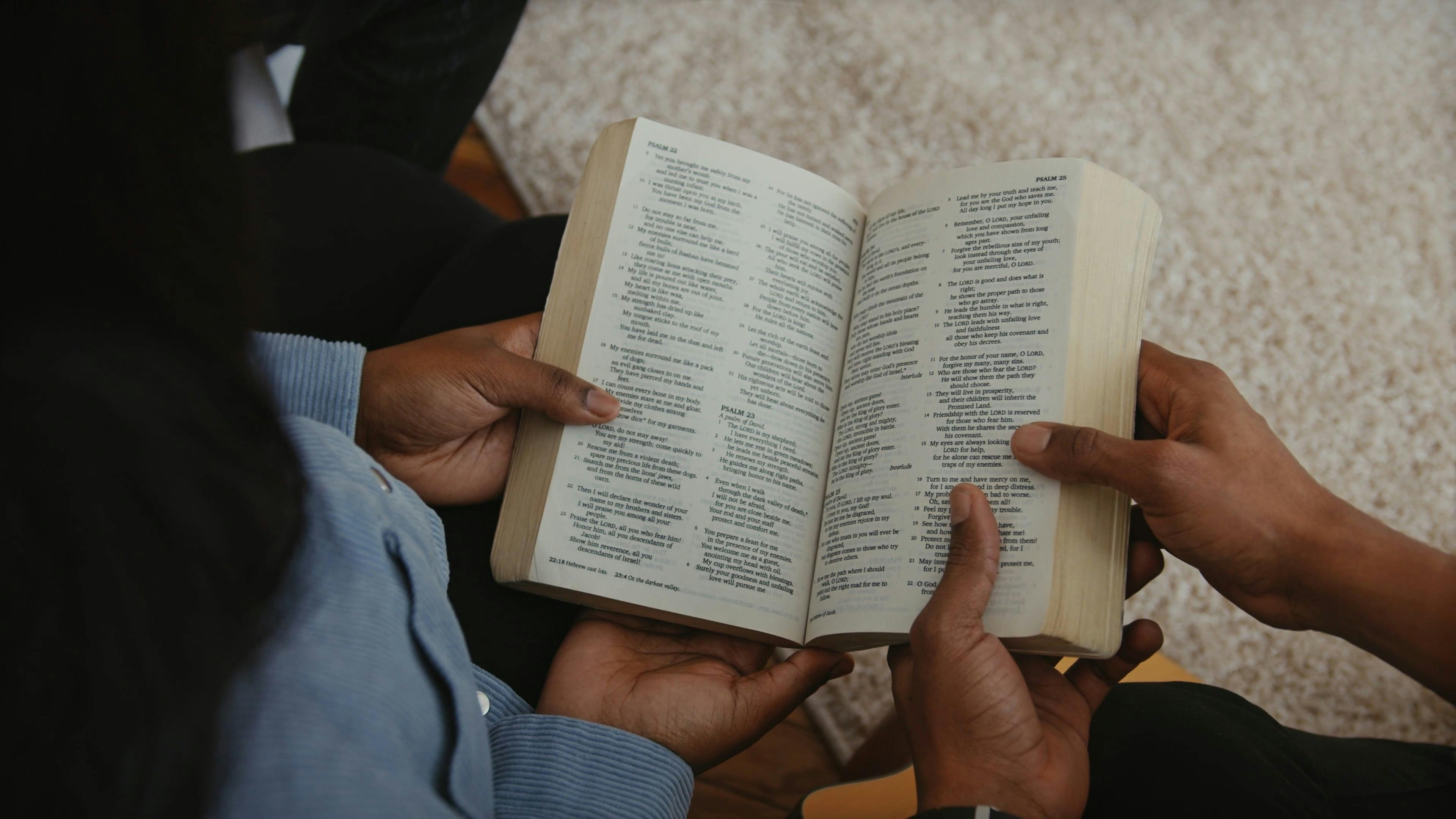 People Holding a Bible · Free Stock Video