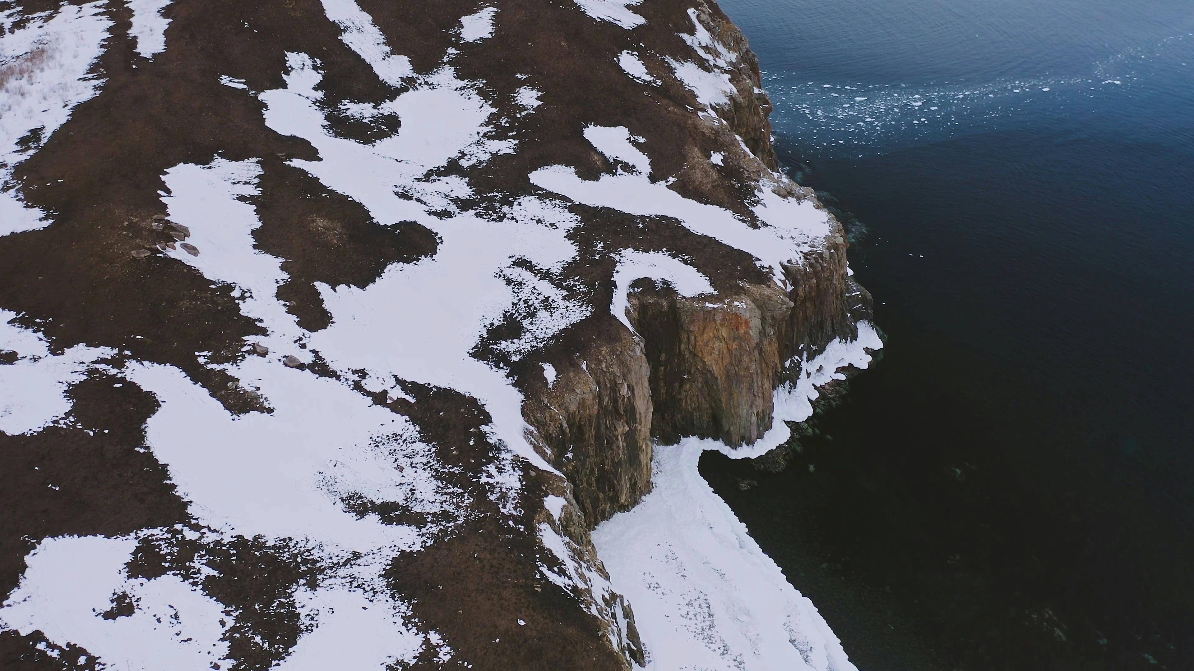Aerial Footage Snow Covered Cliff · Free Stock Video