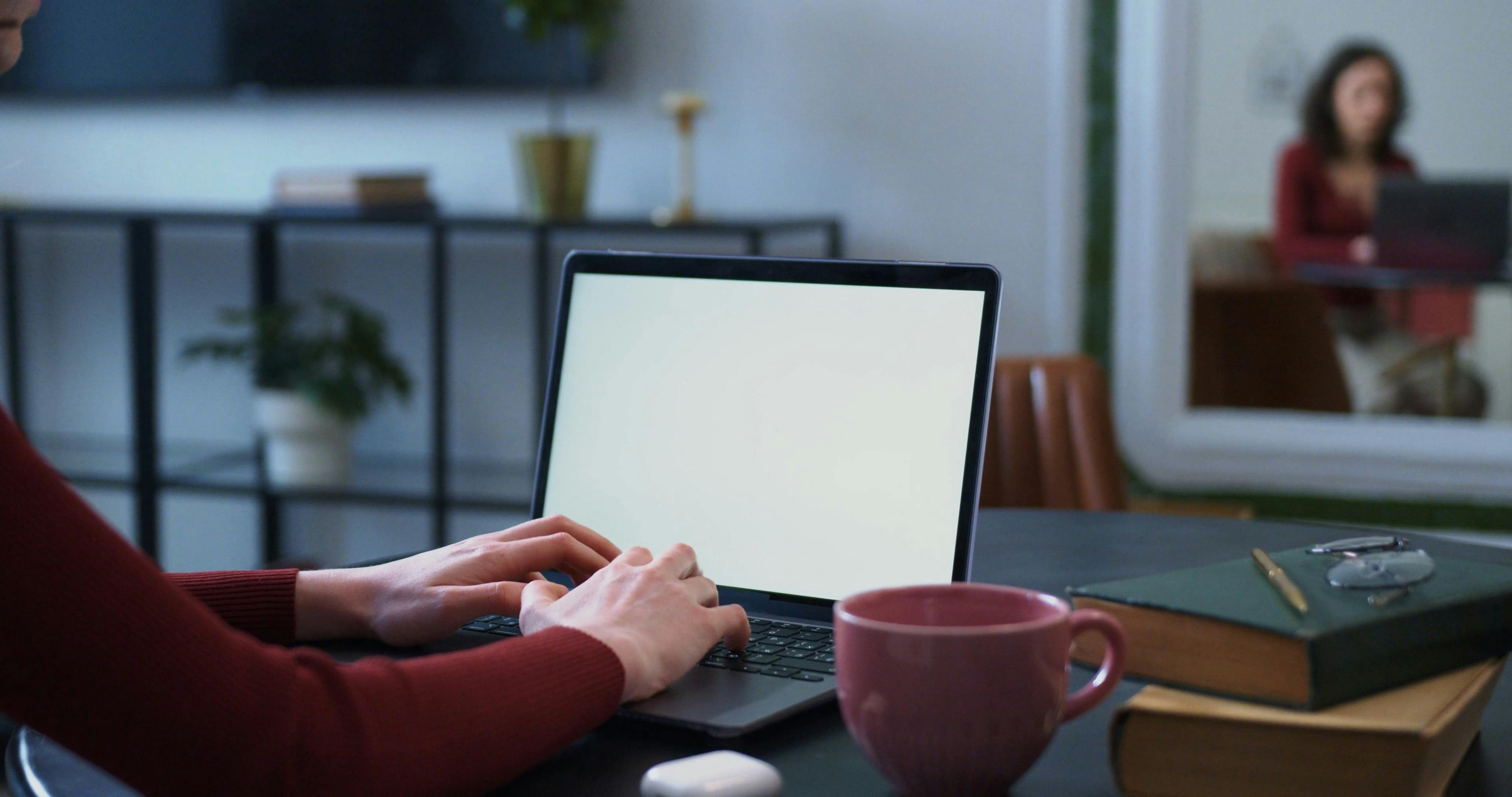 Woman Using a Laptop at Home · Free Stock Video
