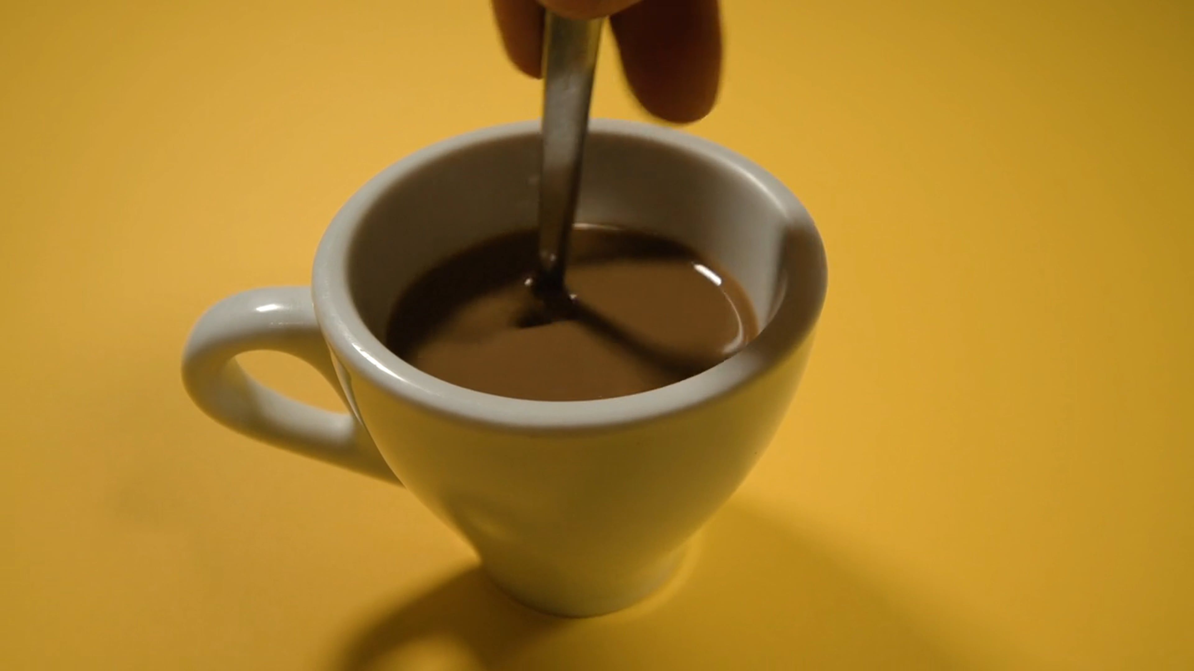 Stirring a Cup of Coffee · Free Stock Video