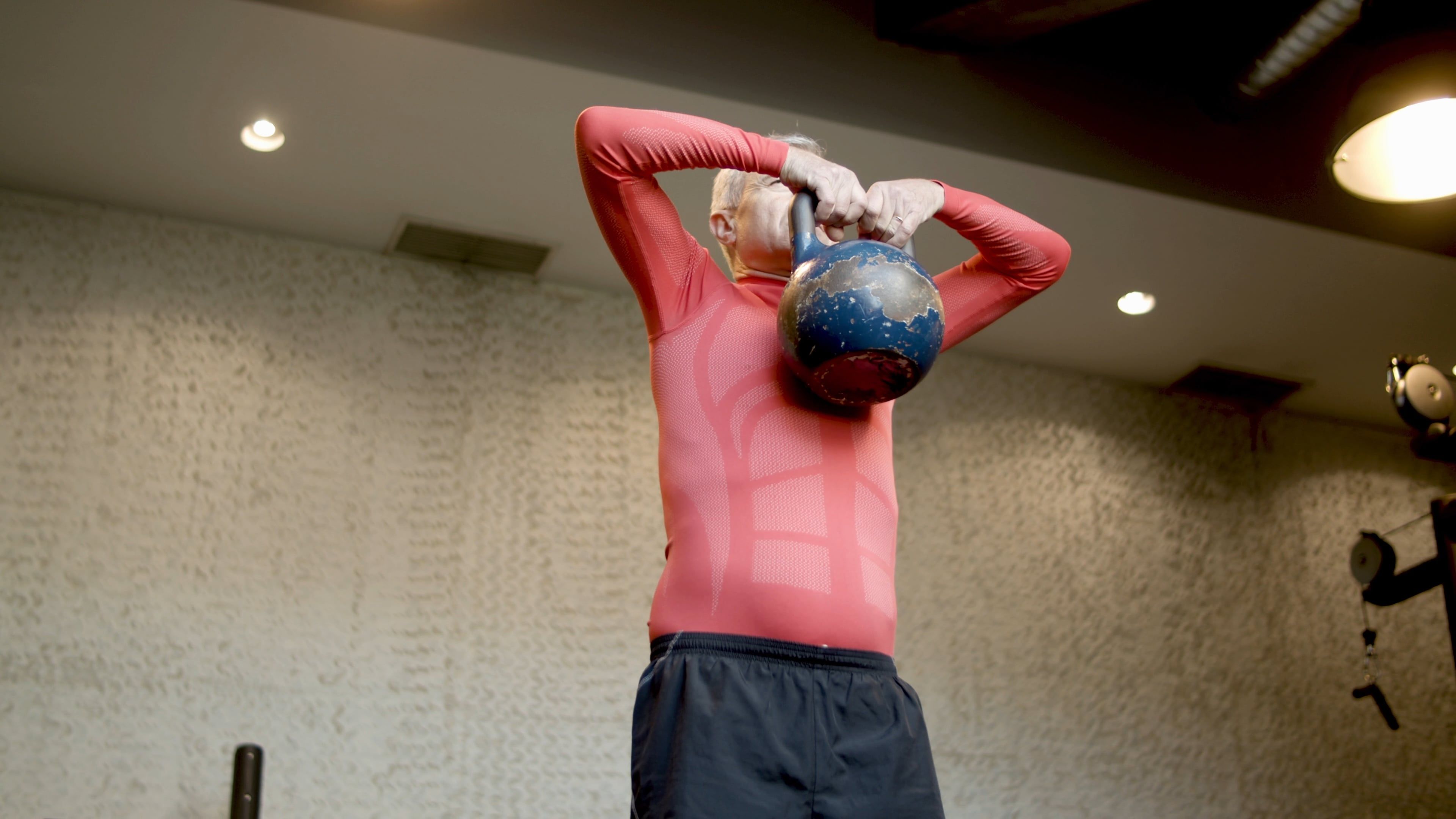 An Man doing Kettlebell Pull-Ups at the Gym · Free Stock Video
