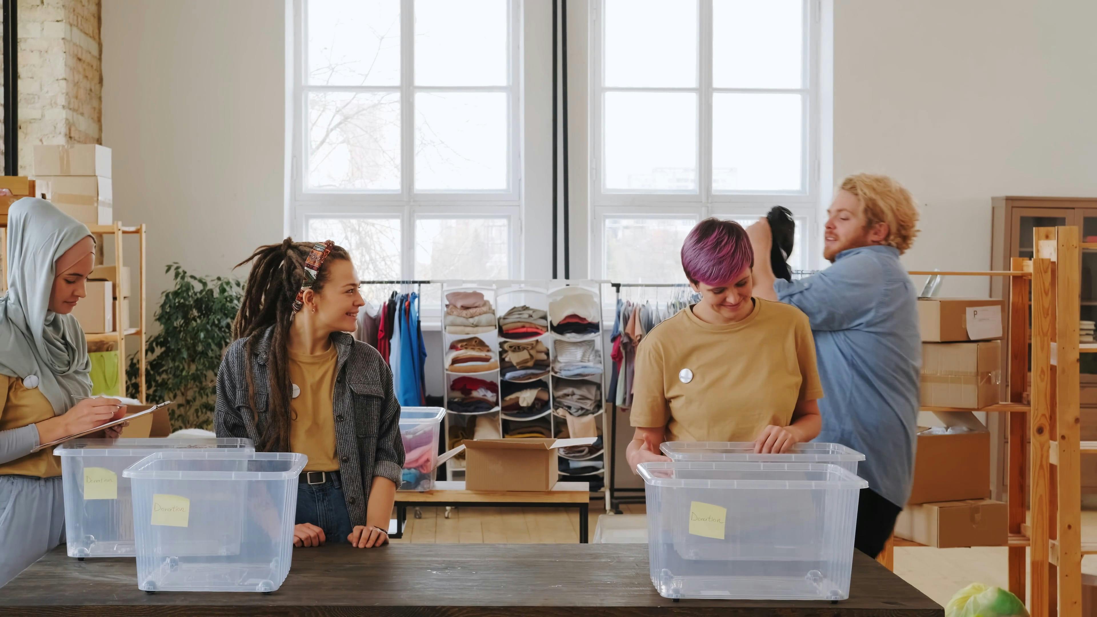 People Folding Clothes · Free Stock Video