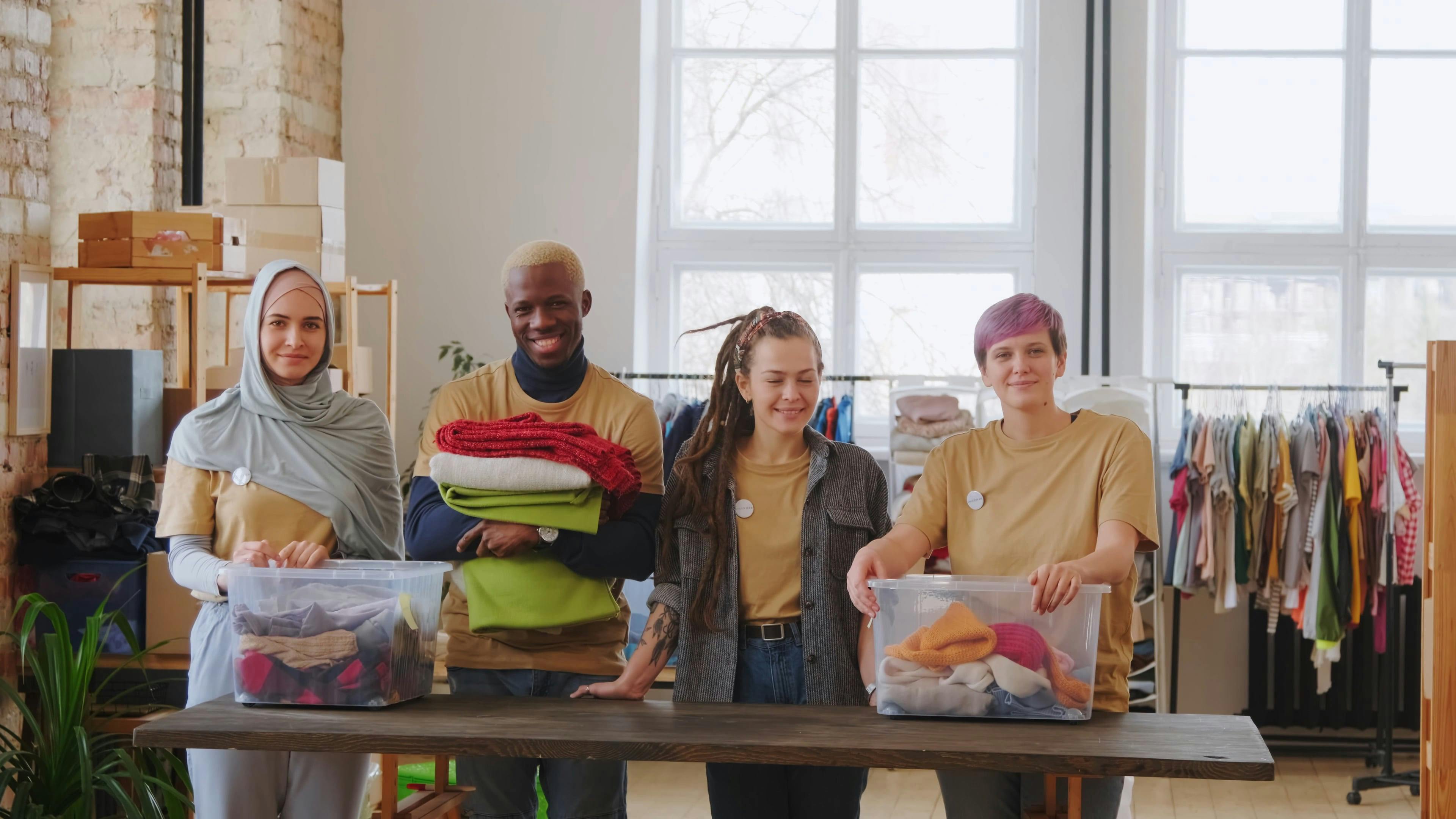 Volunteers Packing Clothes For Donations Free Stock Video Footage ...