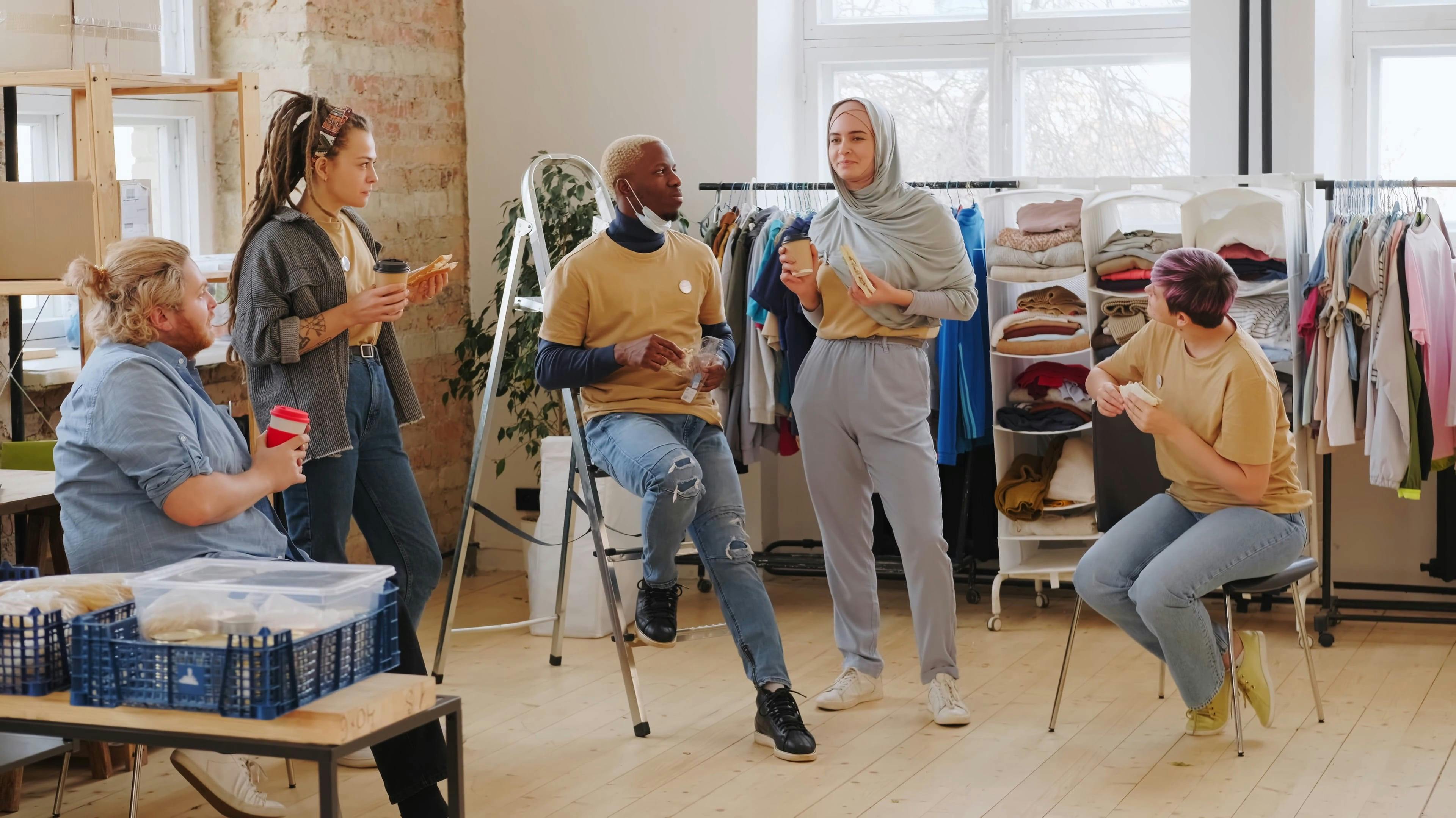 Volunteers Talking During their Break Time · Free Stock Video